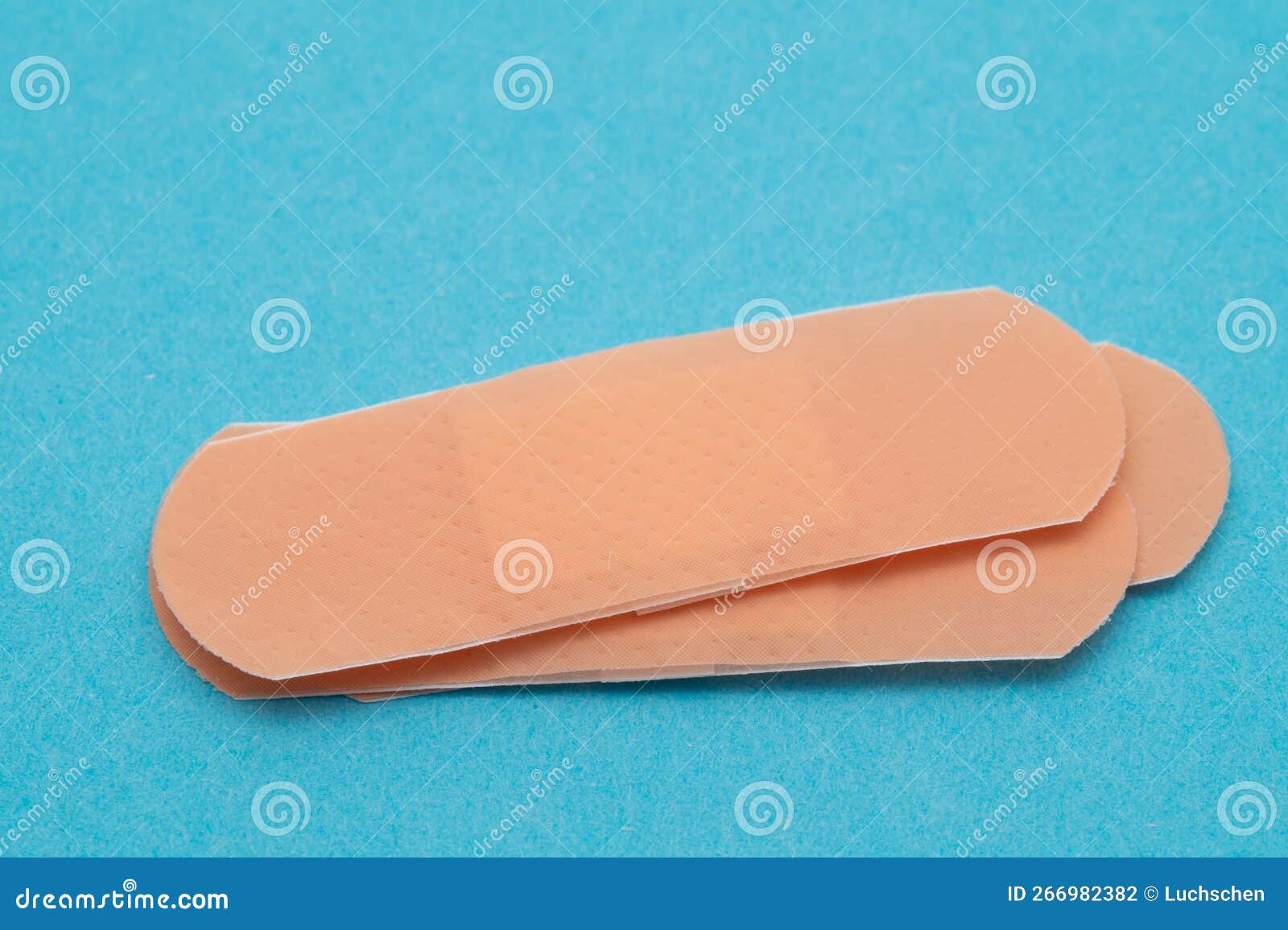 Medical Plaster on a Blue Background Stock Photo - Image of health ...