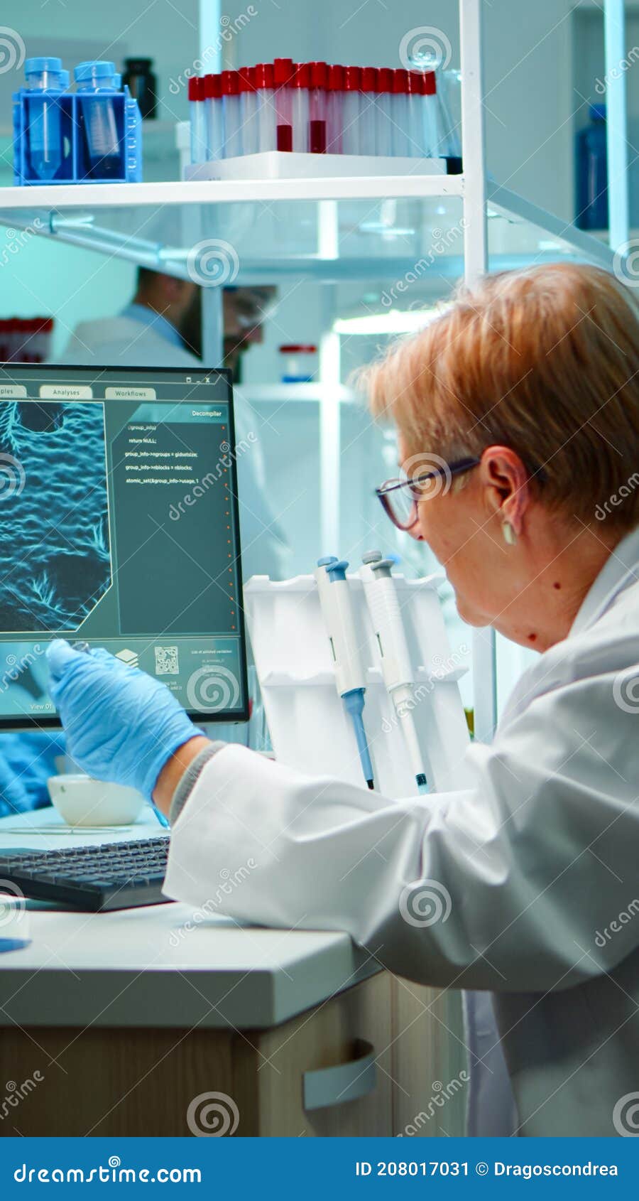 Medical Research Scientist Typing Genetic Codes on Pc Stock Image ...