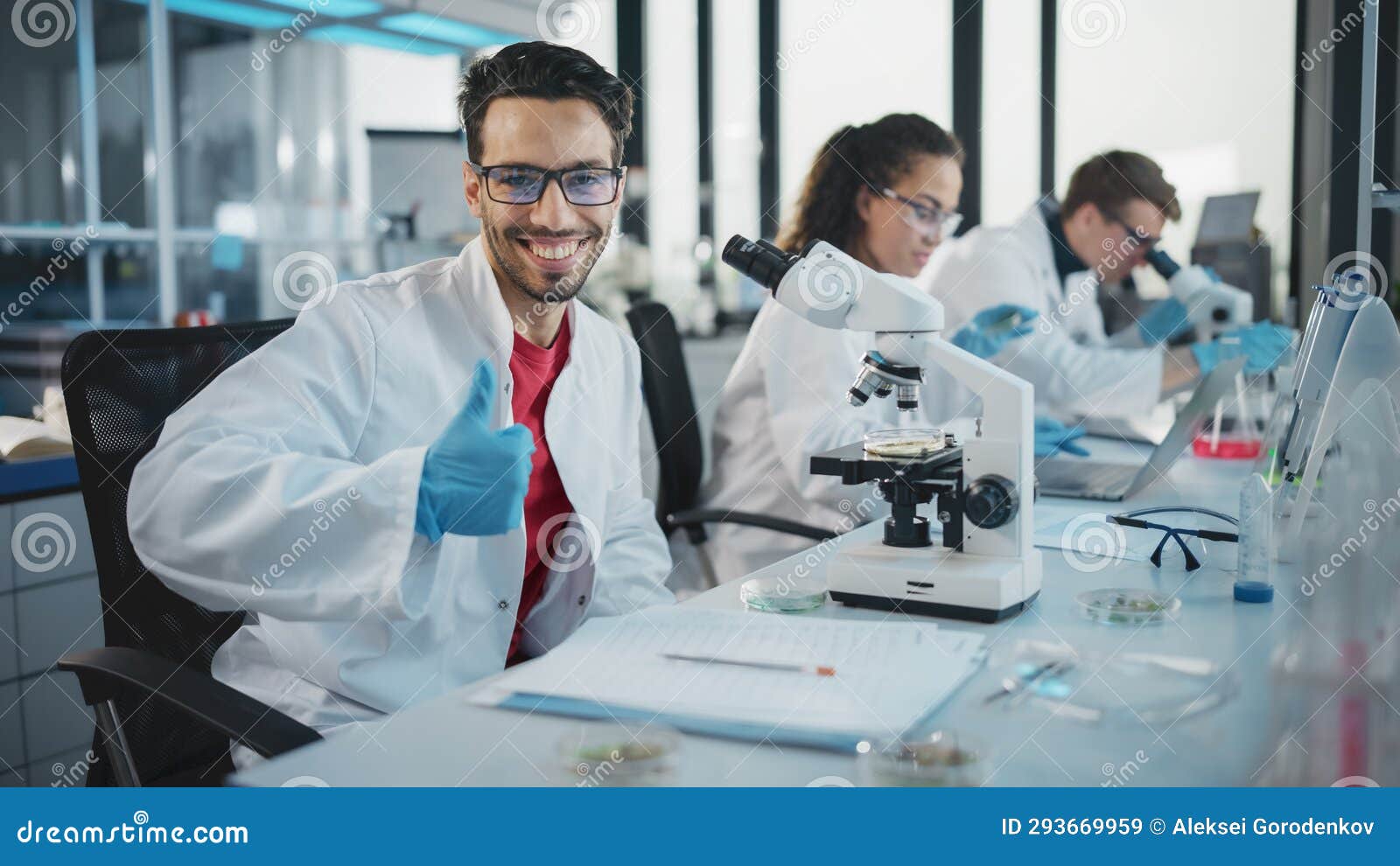 Medical Science Laboratory: Handsome Scientist is Using Microscope for ...