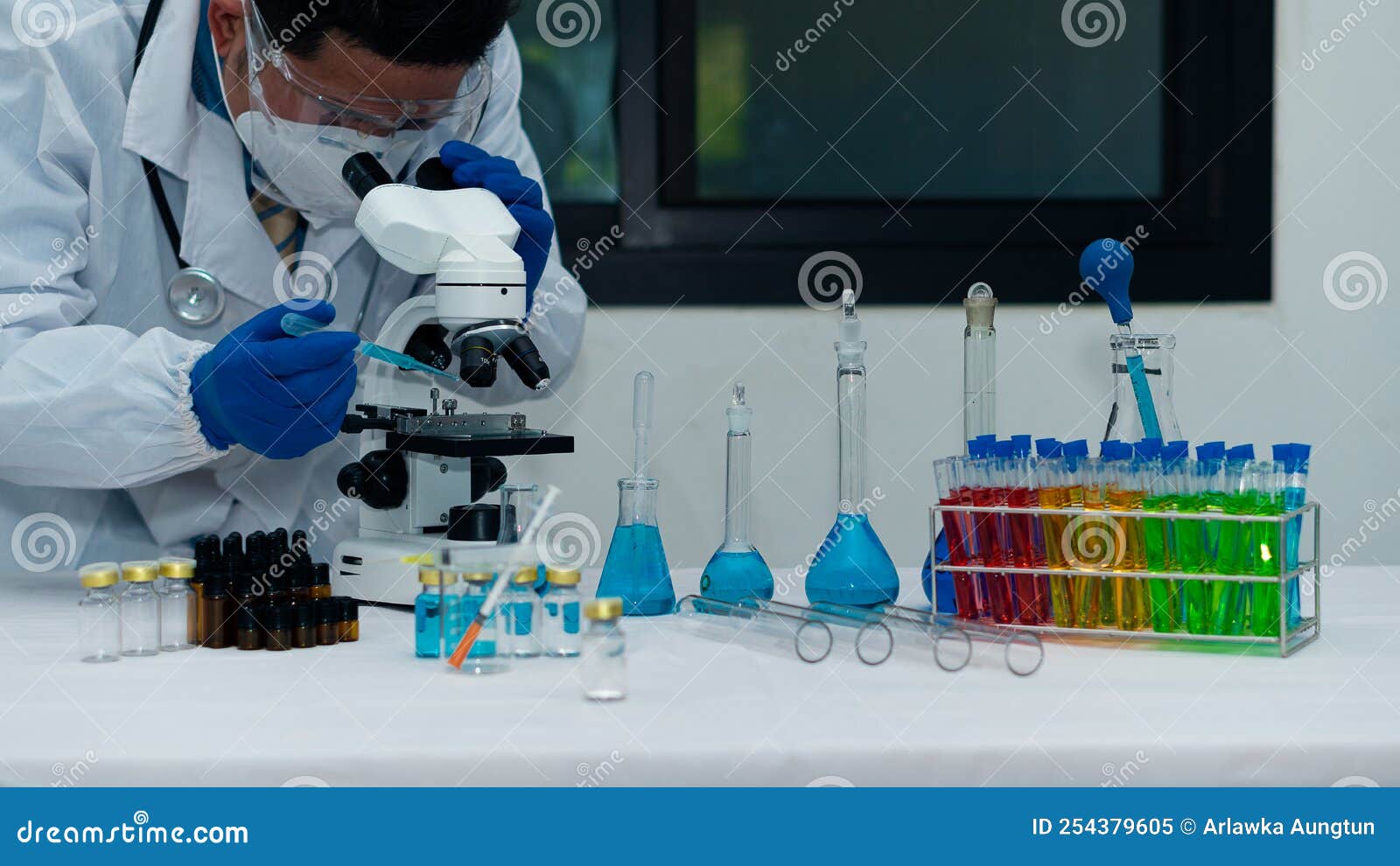 Medical Science Laboratory: a Scientist Looking Under a Microscope ...