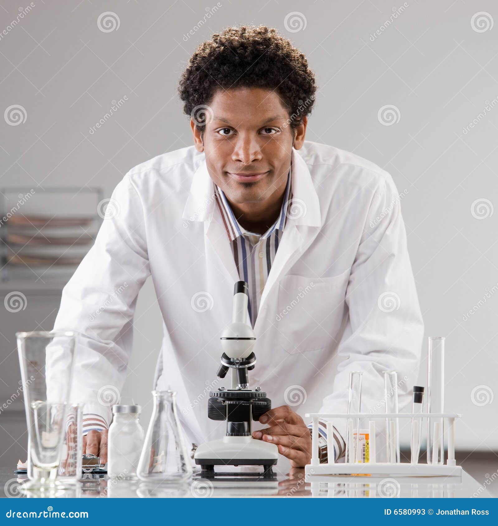 Medical Scientist Posing with Microscope Stock Image - Image of adult ...
