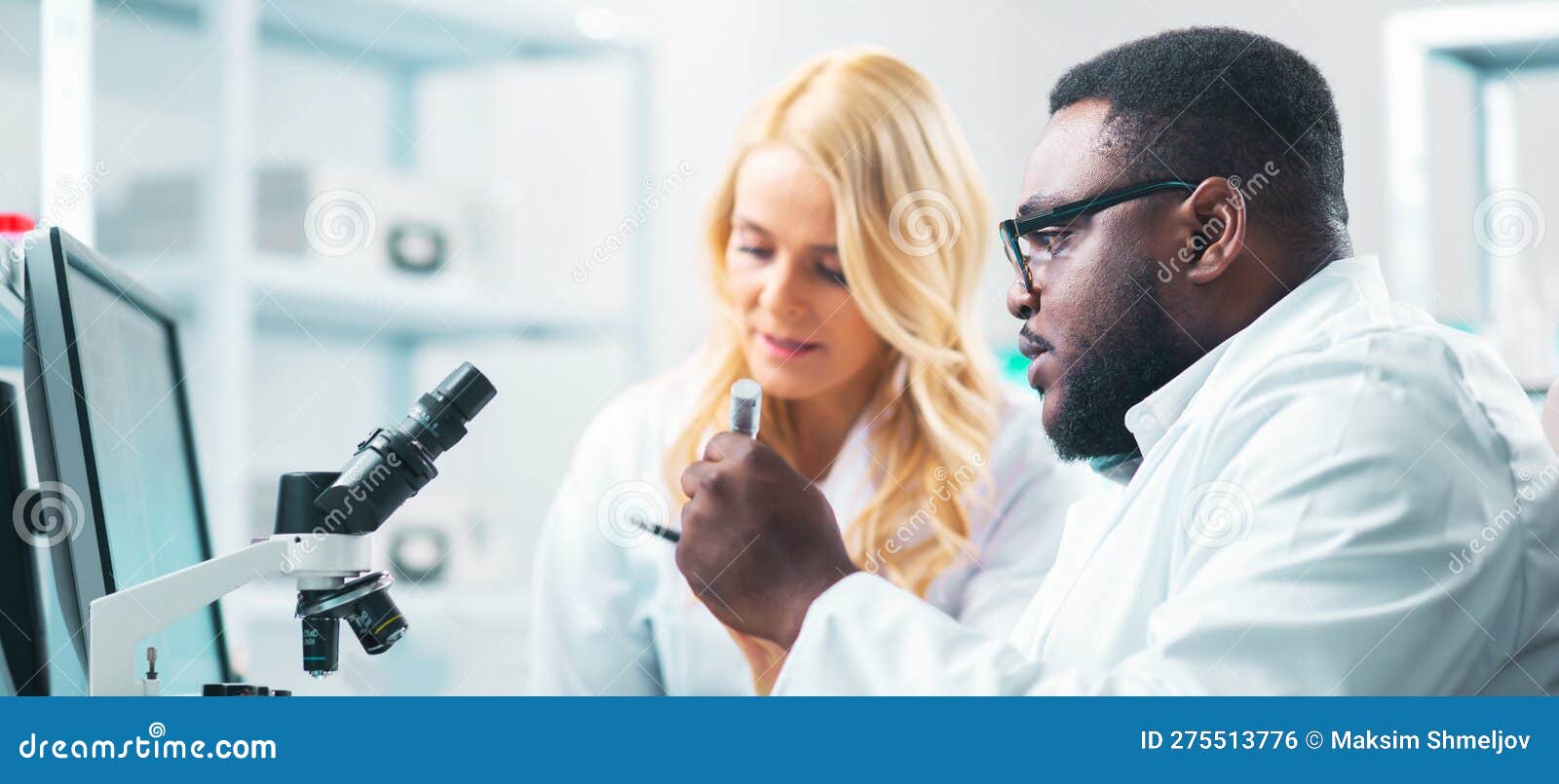 Medical Scientists Working in Lab. Doctor Teaching Interns To Make ...