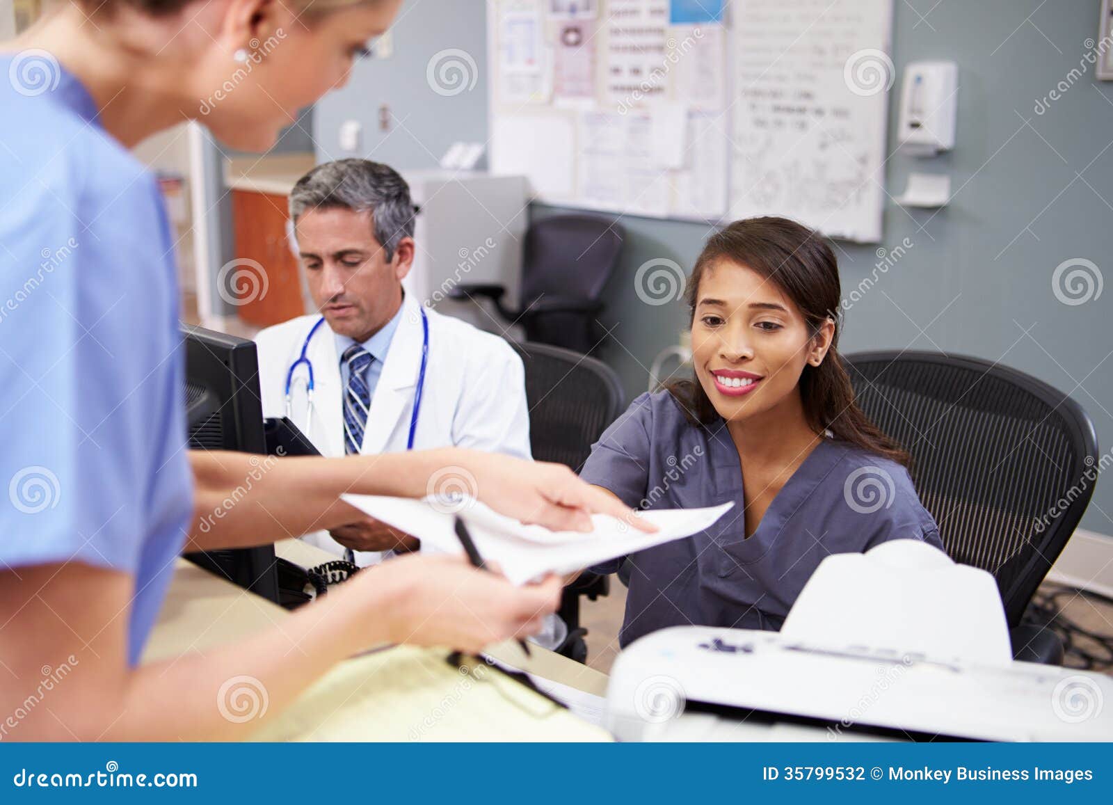 Medical Staff Meeting at Nurses Station Stock Photo - Image of desk ...