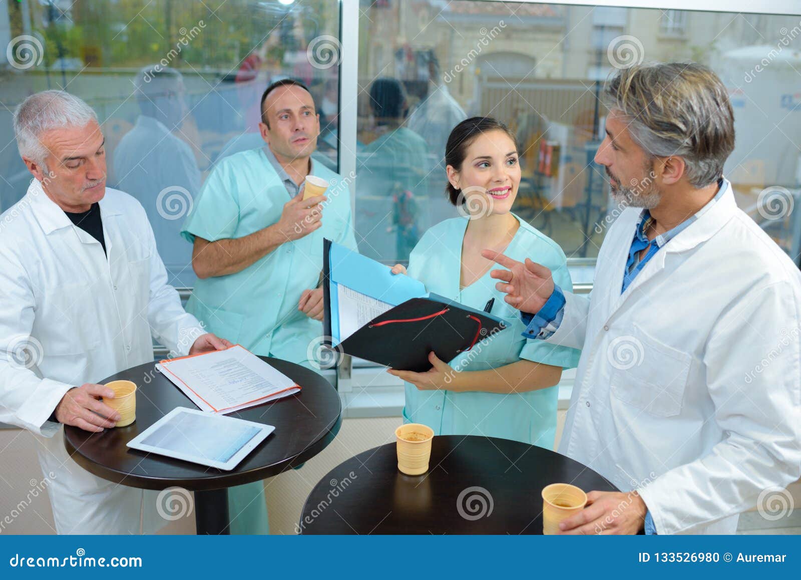 Medical staff on tea break stock photo. Image of relax - 133526980