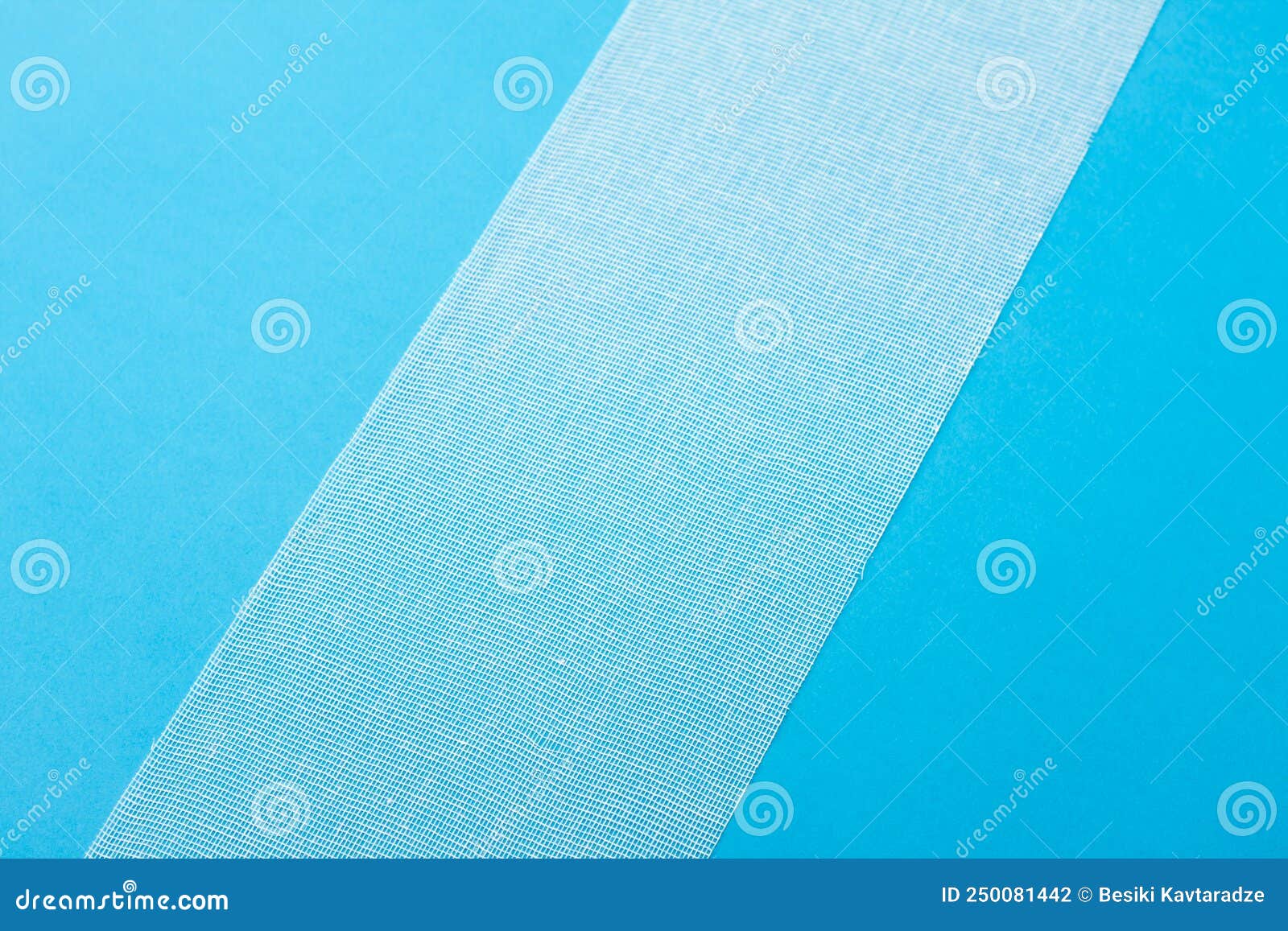 Bandage on blue background stock photo. Image of injury - 250081442