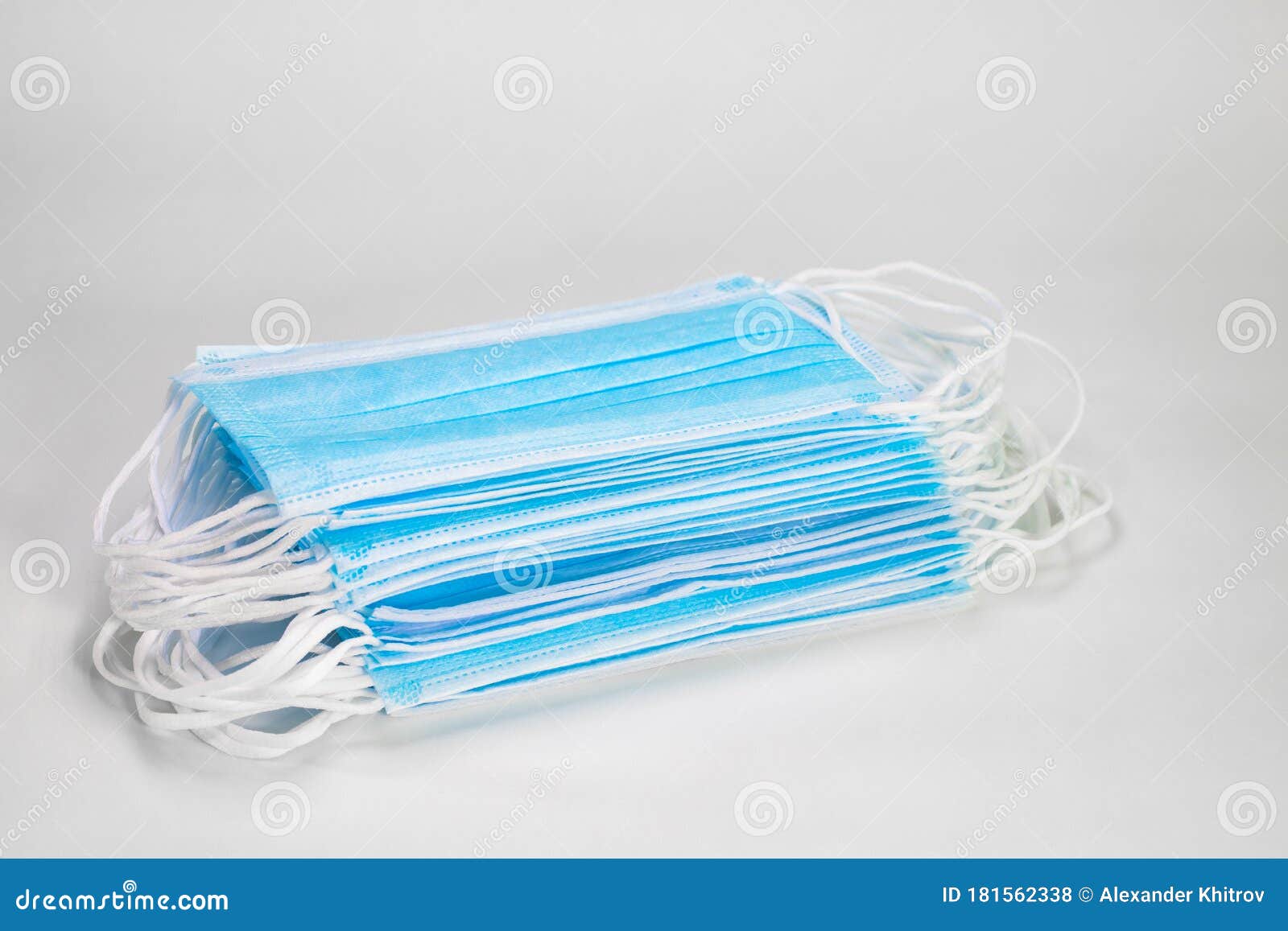 Medical Sterile Disposable Masks. Neat Stack of Blue Medical Masks on a ...