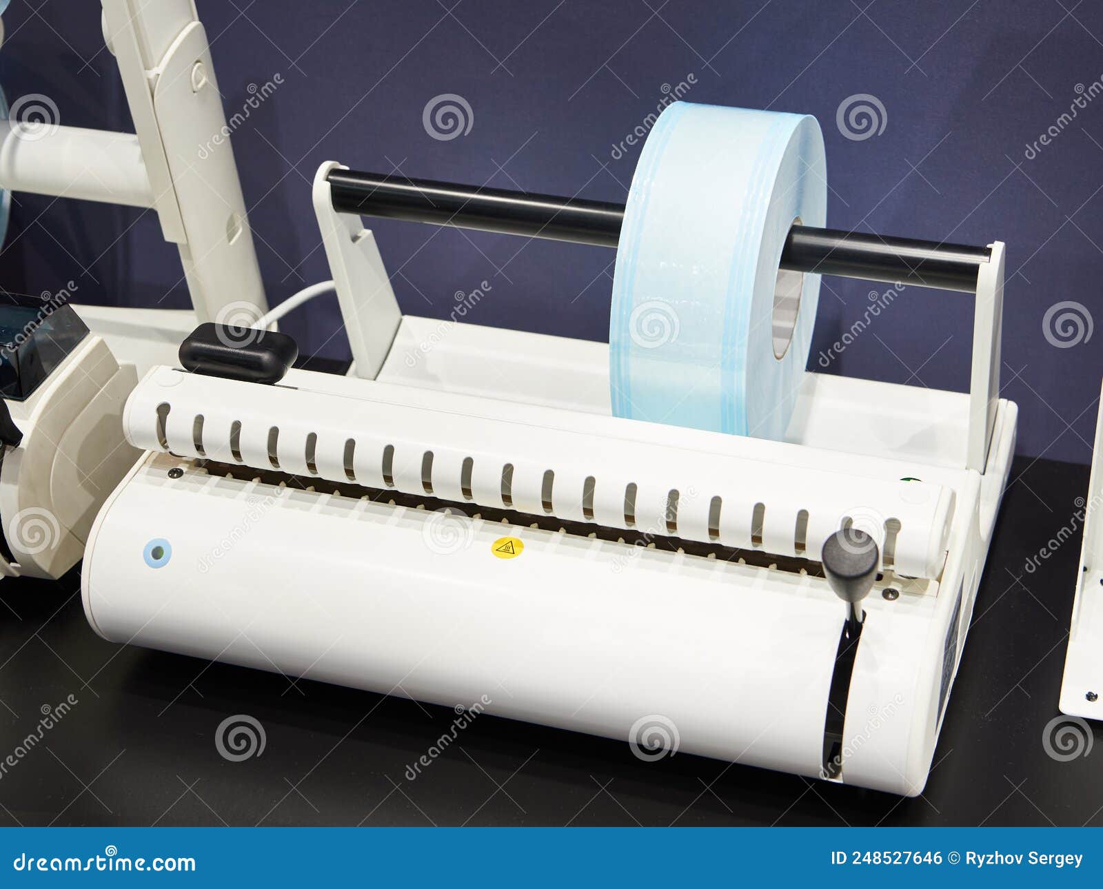 Medical Sterilization Packaging Machine Stock Photo - Image of clinic ...