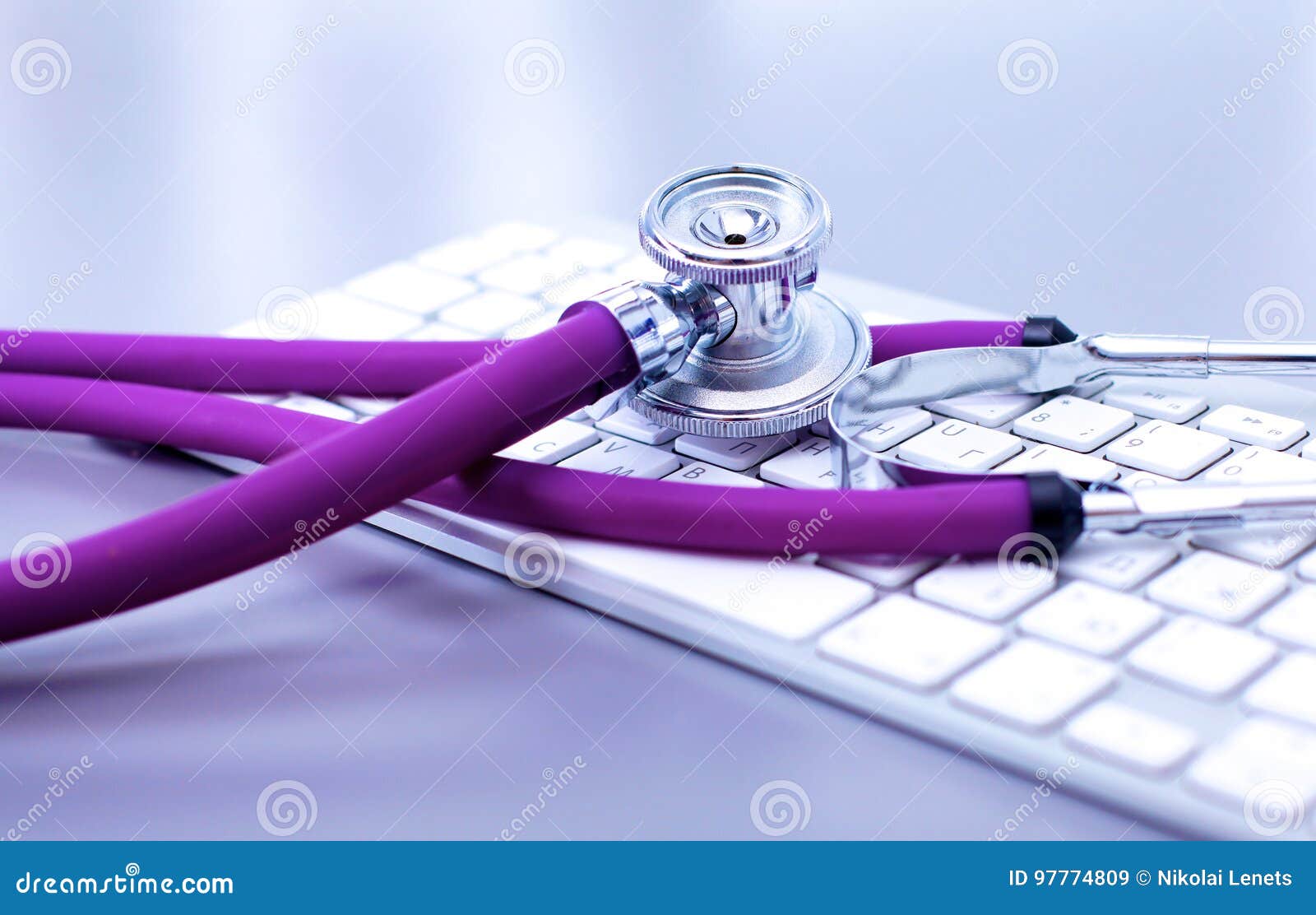 Medical Stethoscope with a Computer on the Desk Stock Image - Image of ...