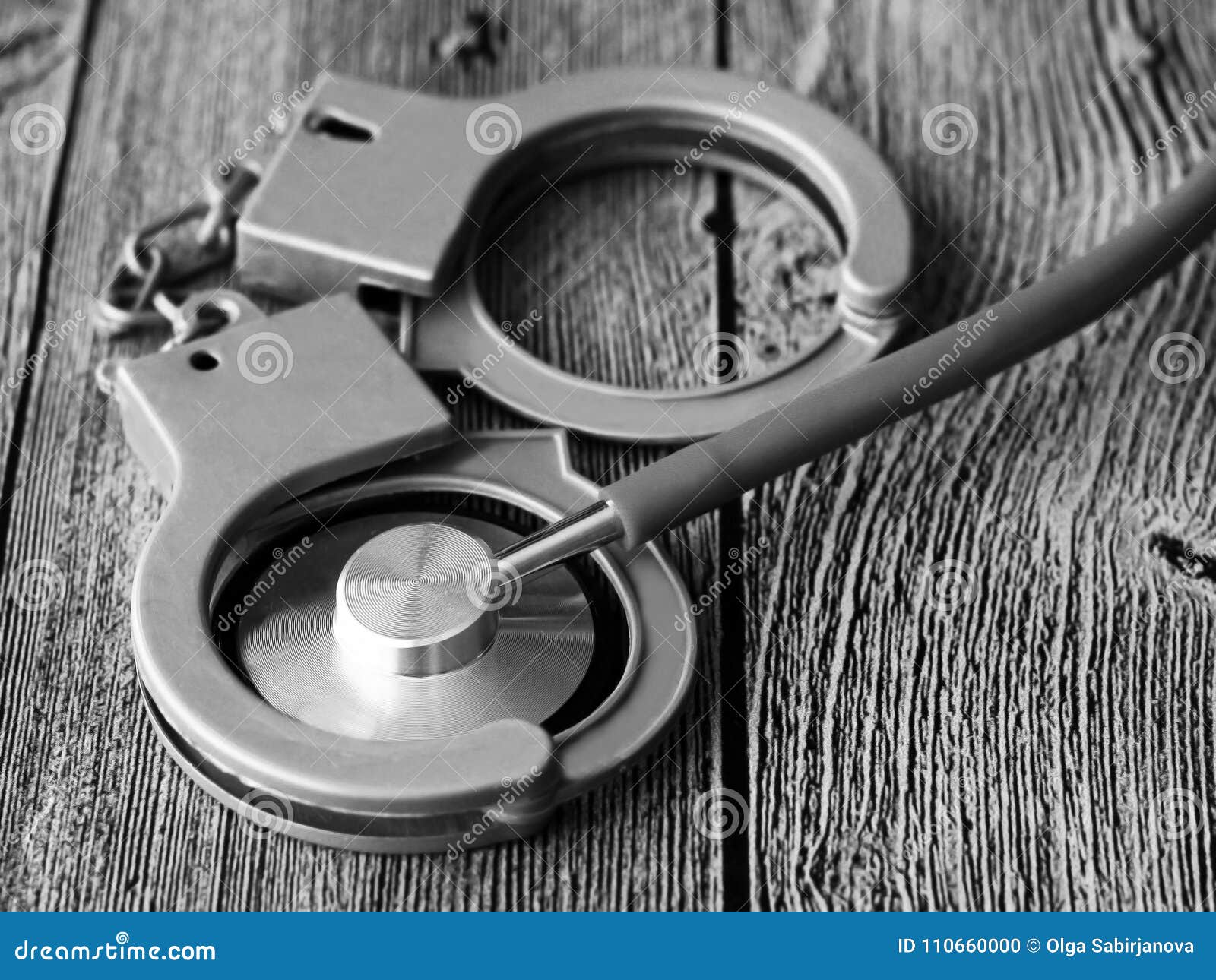 Medical Stethoscope and Handcuffs Stock Photo - Image of folder, crime ...