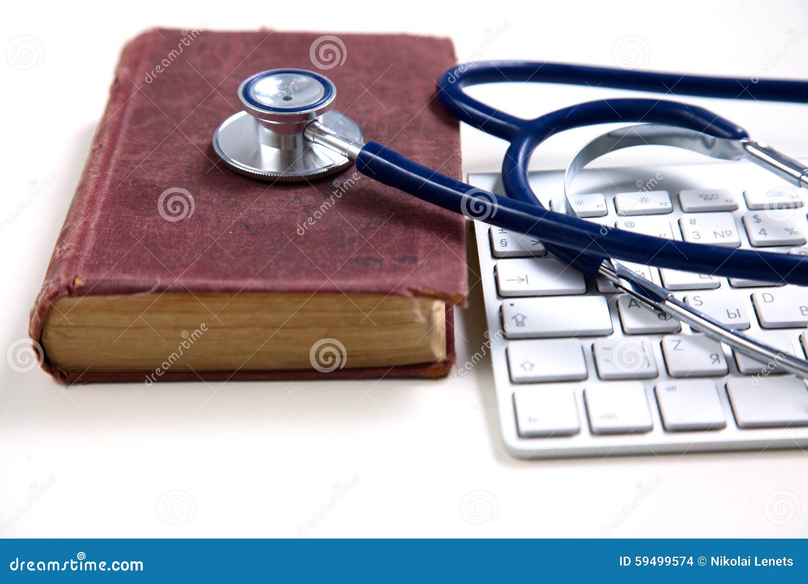 Medical Stethoscope with Old Books and Laptop on a Stock Photo - Image ...