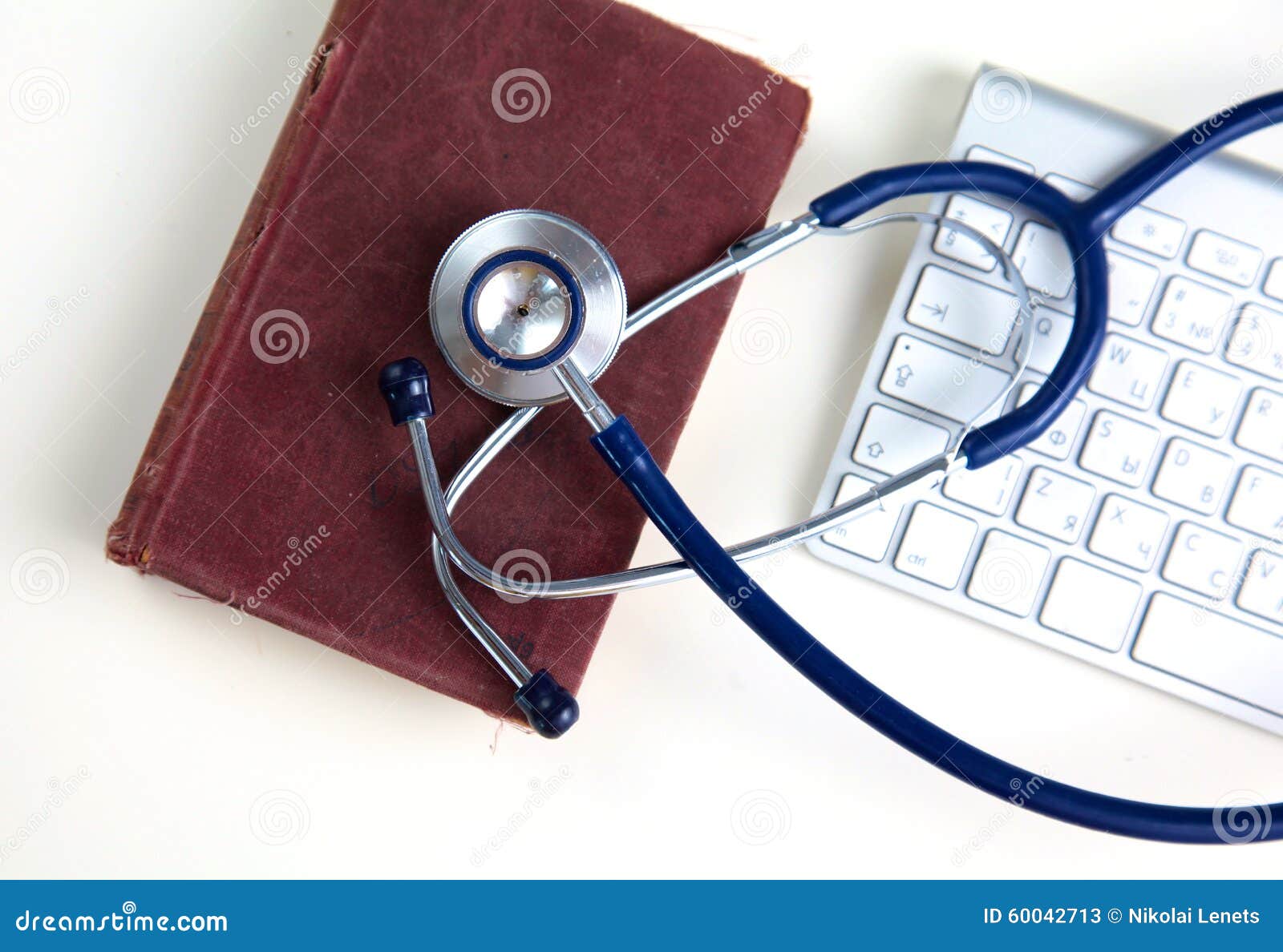 Medical Stethoscope with Old Books and Laptop on a Stock Image - Image ...