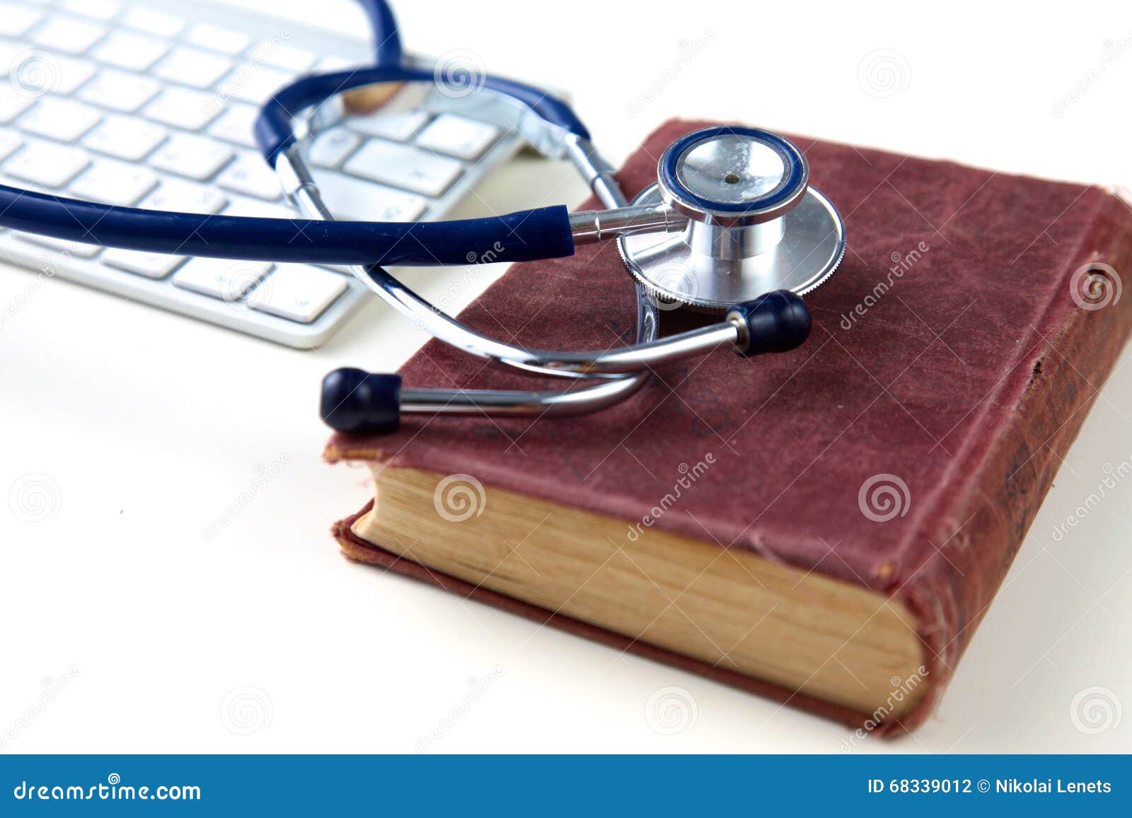 Medical Stethoscope with Old Books and Laptop on a Table Stock Photo ...