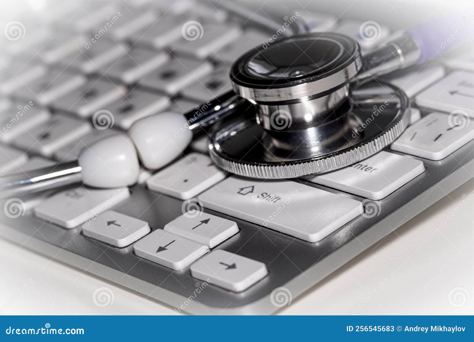 Medical Stethoscope on a White Computer Keyboard. Stock Image - Image ...