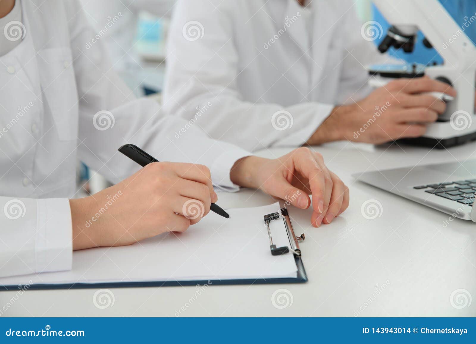 Medical Student with Clipboard Working in Scientific Laboratory Stock ...