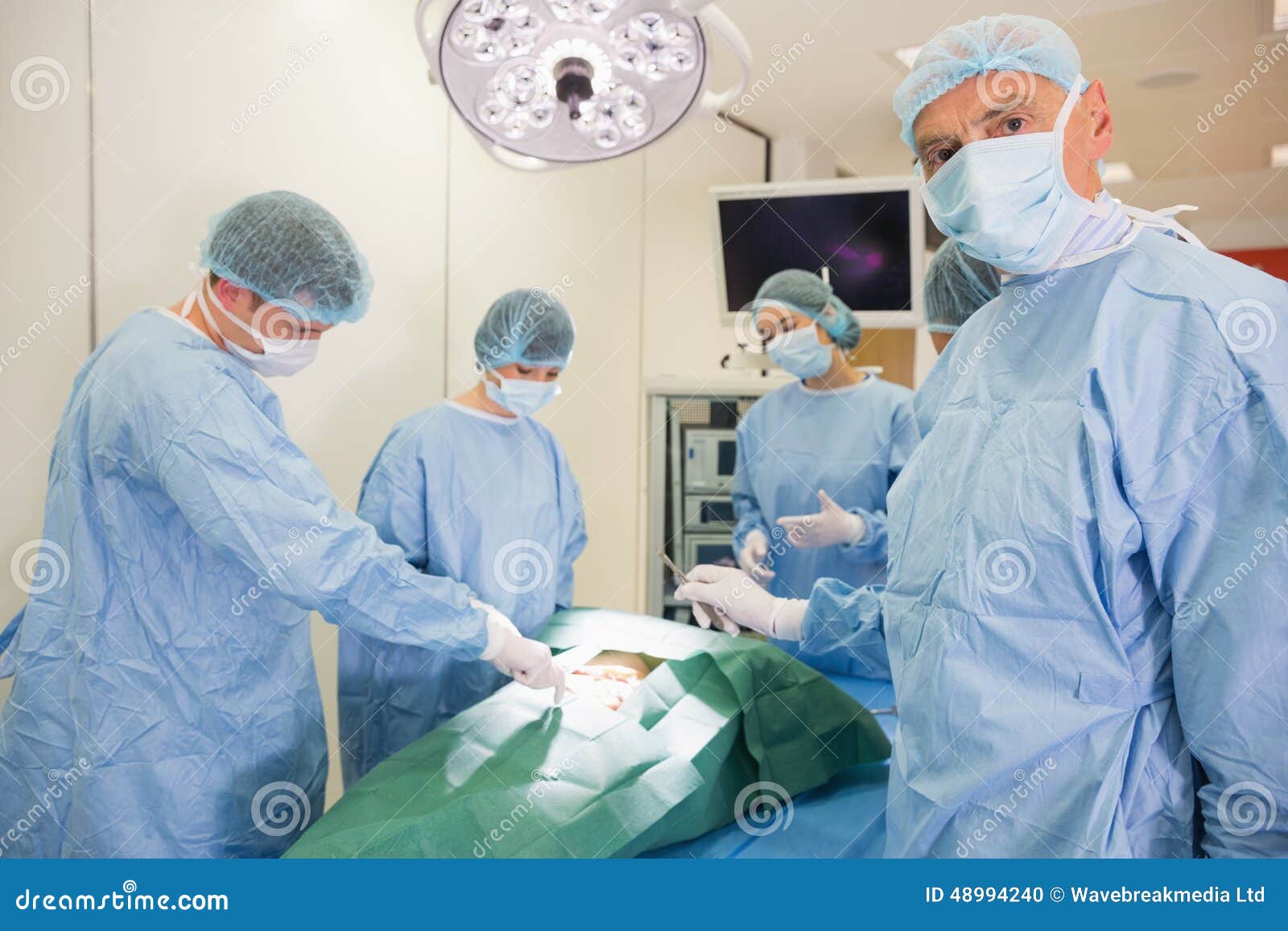 Medical Student Looking at Camera during Practice Surgery Stock Photo ...