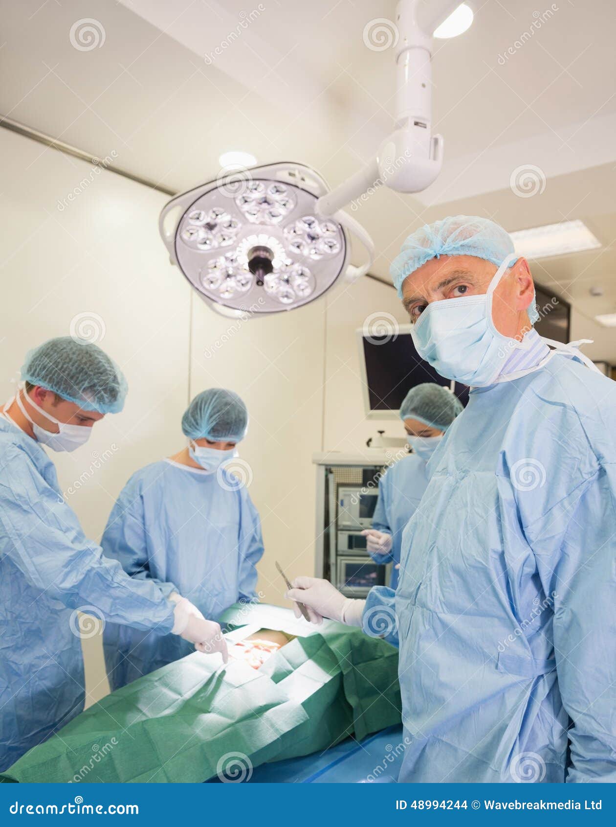 Medical Student Looking at Camera during Practice Surgery Stock Photo ...