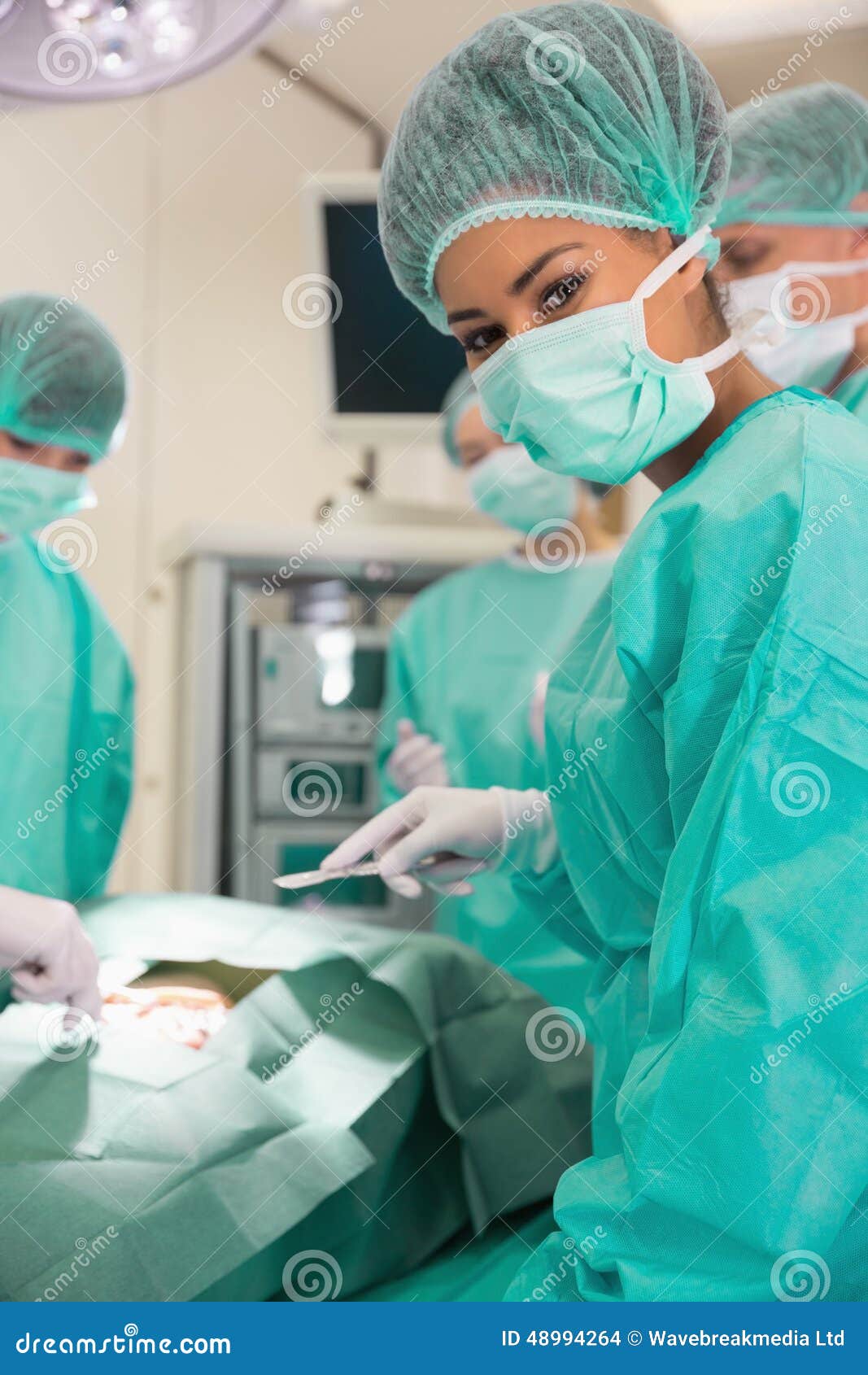 Medical Student Looking at Camera during Practice Surgery Stock Photo ...