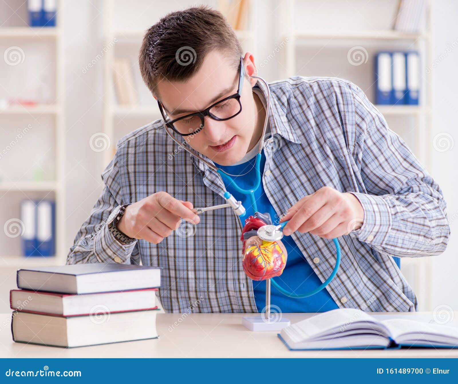 Medical Student Studying Heart in Classroom during Lecture Stock Photo ...