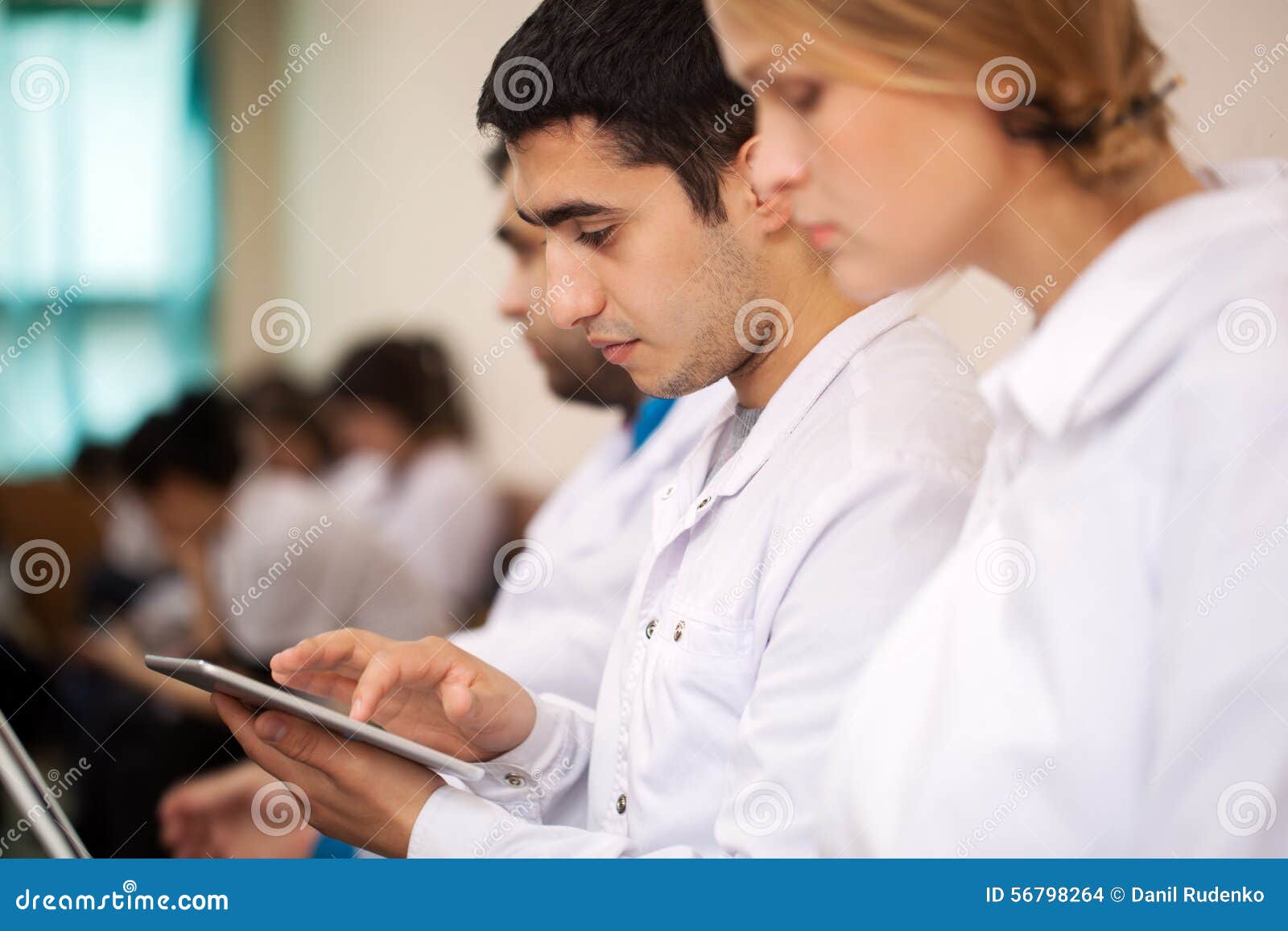 Medical Student Working with Pad on the Conference Stock Photo - Image ...