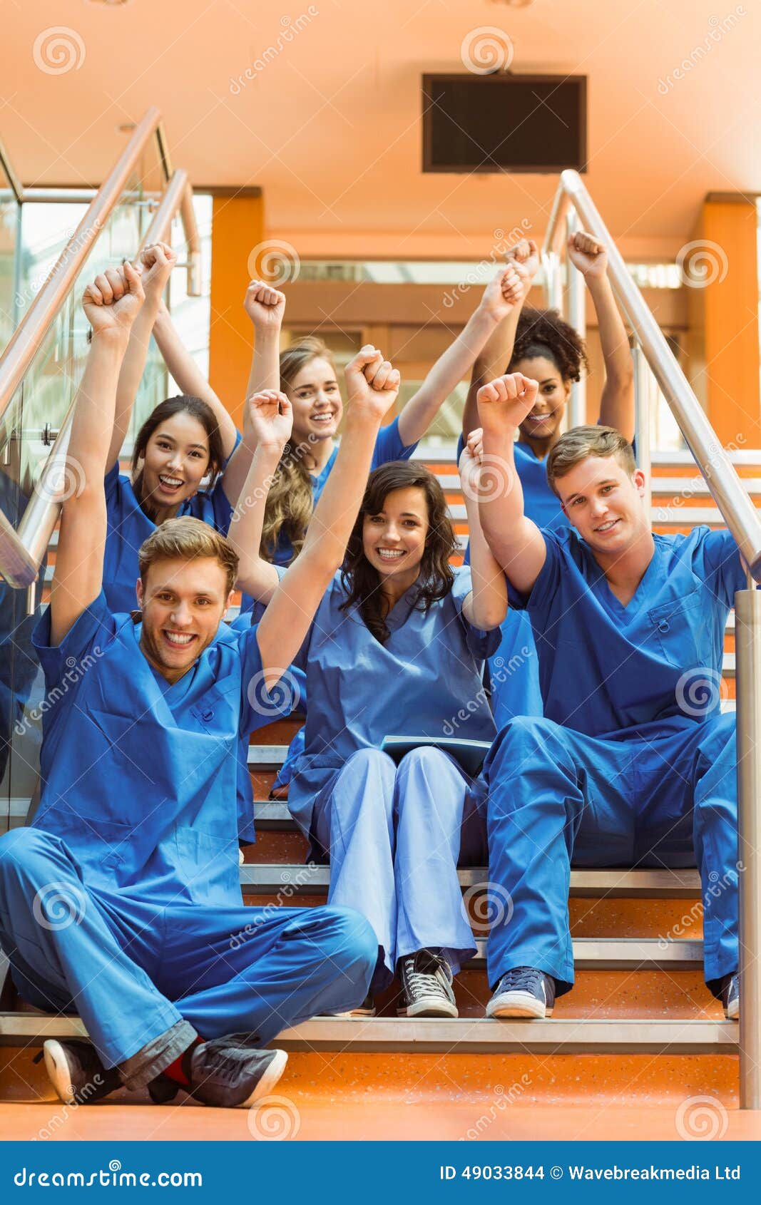 Medical Students Cheering on the Steps Stock Photo - Image of front ...