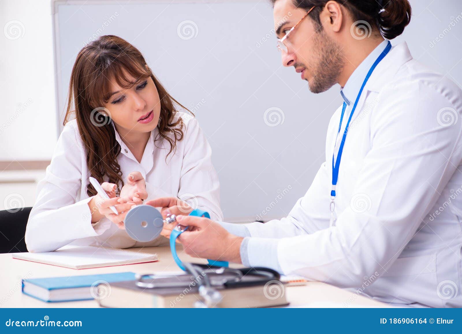 Medical Students in the Classroom Stock Photo - Image of doctor, mirror ...