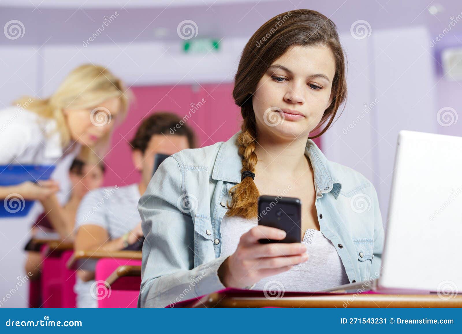Medical Students with Phone and Laptops in Auditorium Stock Image ...