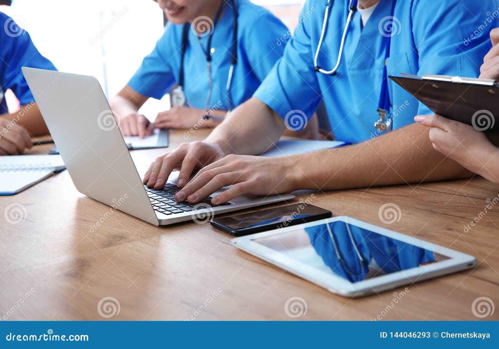 Medical Students Studying at Table Stock Image - Image of adult ...