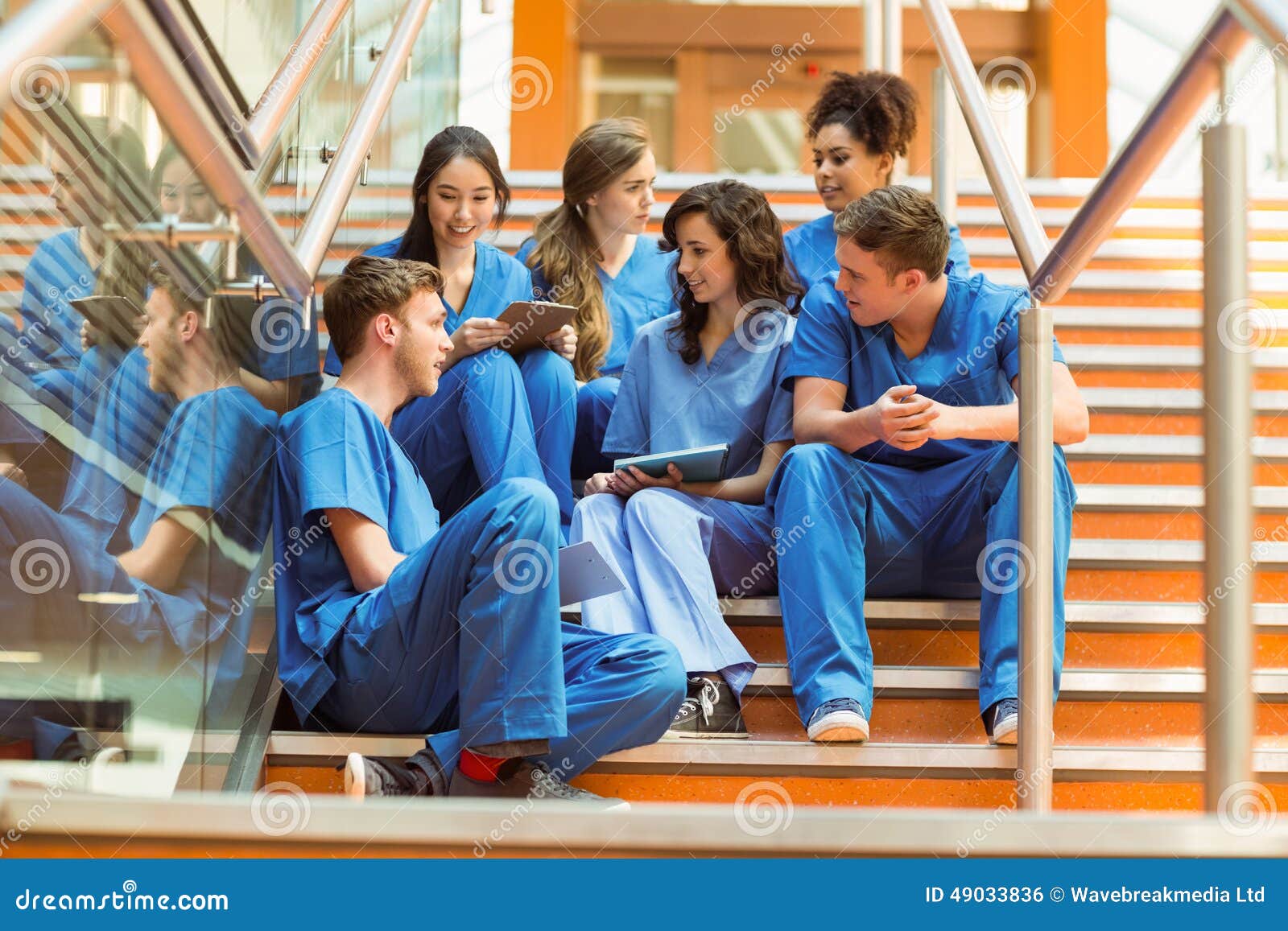 Medical Students Taking a Break on the Steps Stock Photo - Image of ...