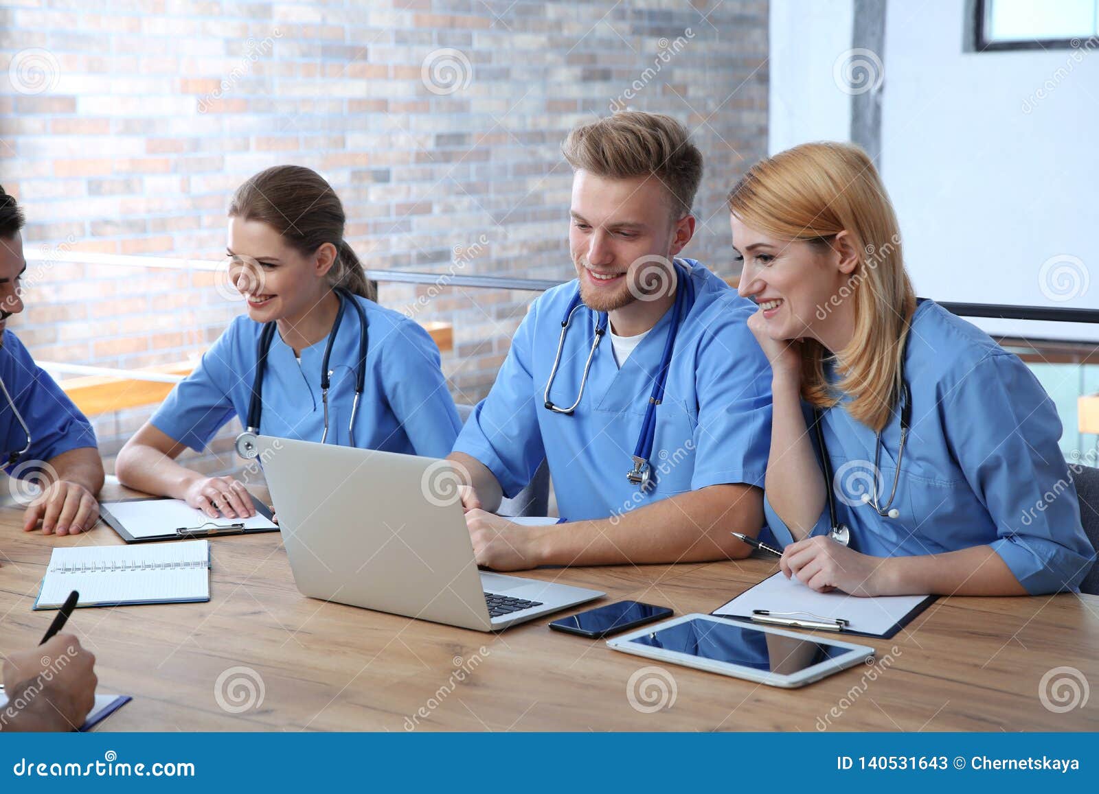 Medical Students in Uniforms Studying Stock Image - Image of doctor ...
