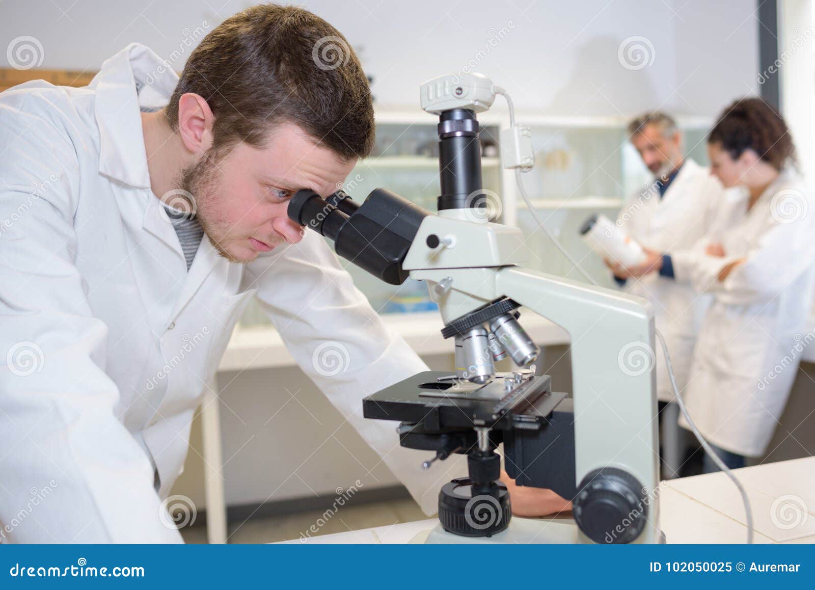 Medical Students Working with Microscope at University Stock Image ...