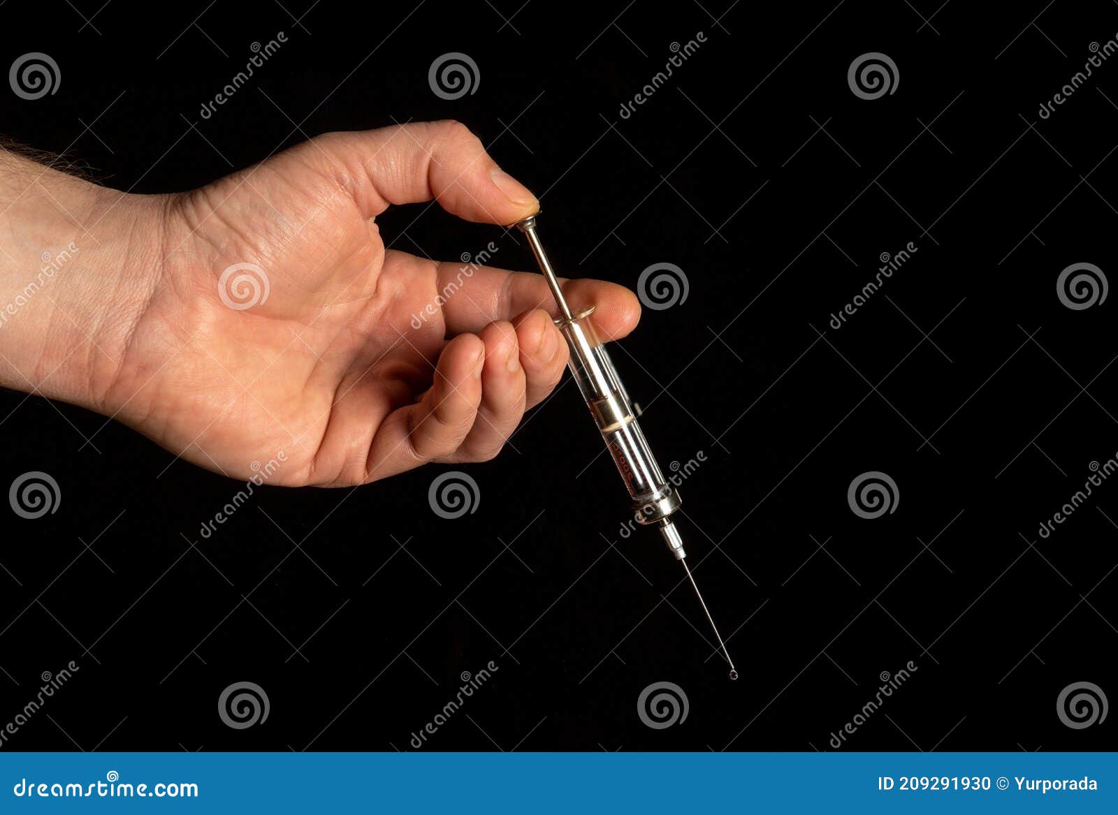 Medical Syringe in Man Hand on Black Isolated Background Stock Photo ...