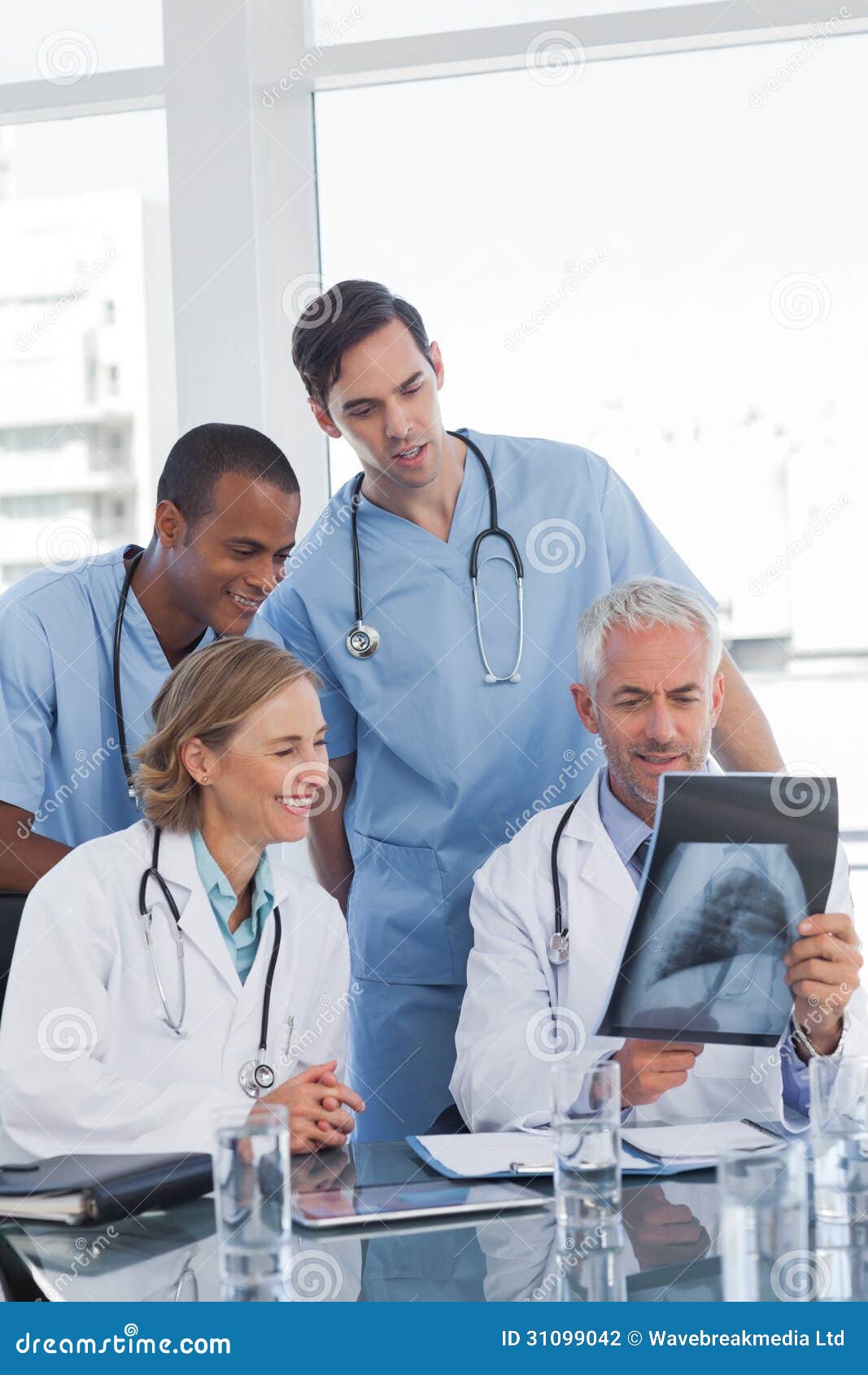 Medical Team Examining Radiography Royalty-Free Stock Image ...