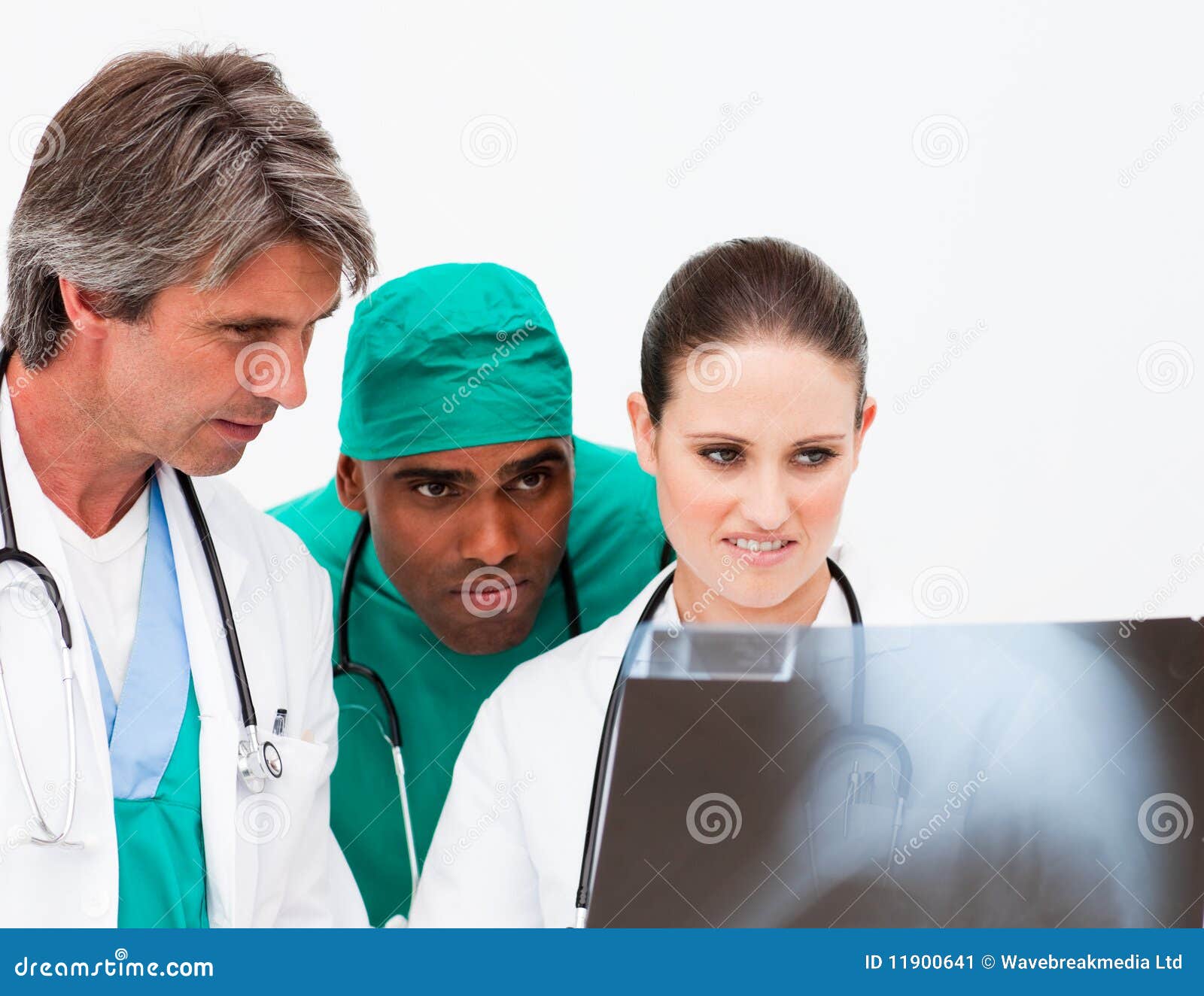 Medical Team Examining an X-ray Stock Image - Image of patient, african ...
