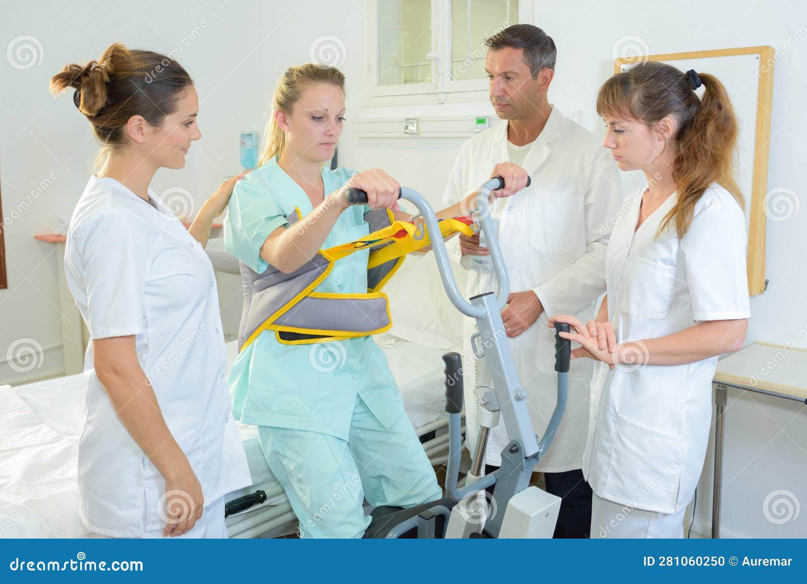 Medical Team Gathering Around Patient in Physiotherapy Section Stock ...