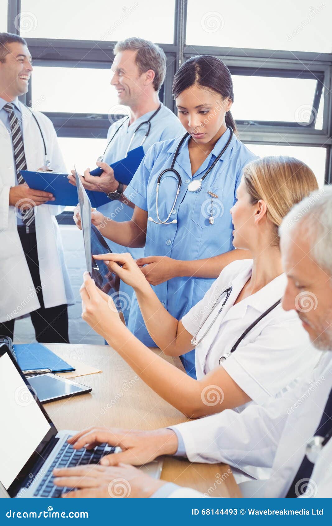 Medical Team Interacting in Conference Room Stock Image - Image of ...
