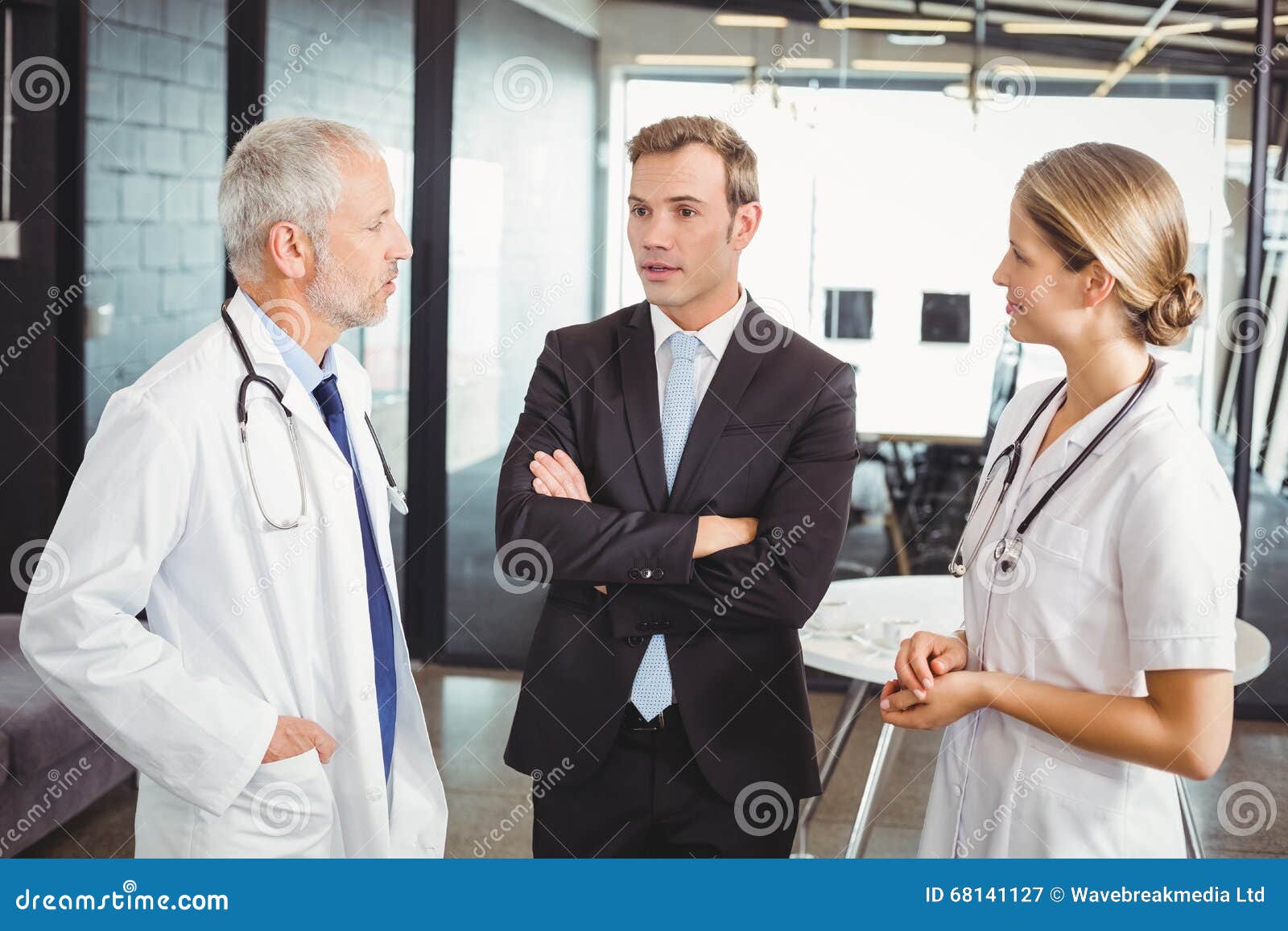 Medical Team Interacting with Each Other Stock Image - Image of care ...