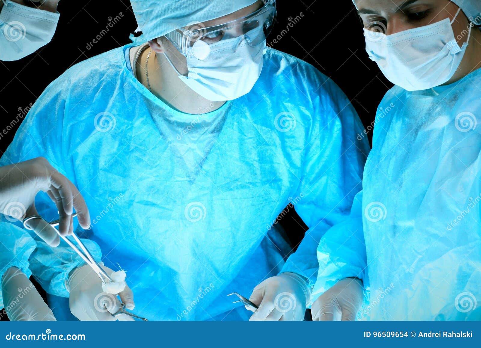 Medical Team Performing Operation. Group of Surgeon at Work in ...
