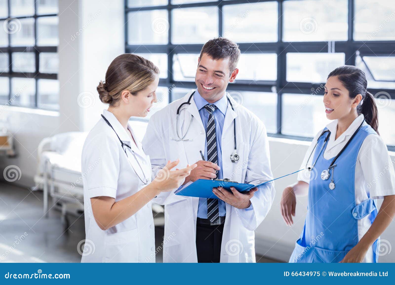 Medical Team Standing and Talking Stock Image - Image of male ...
