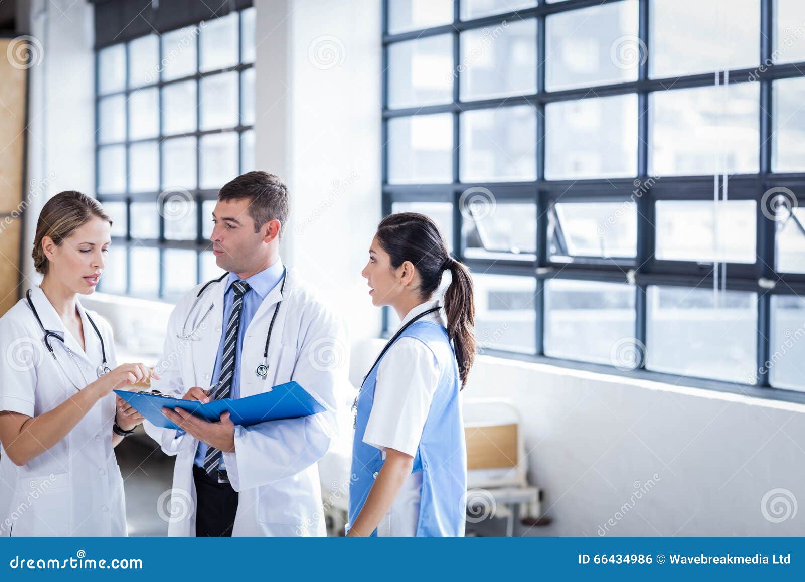 Medical Team Standing and Talking Stock Photo - Image of adult ...