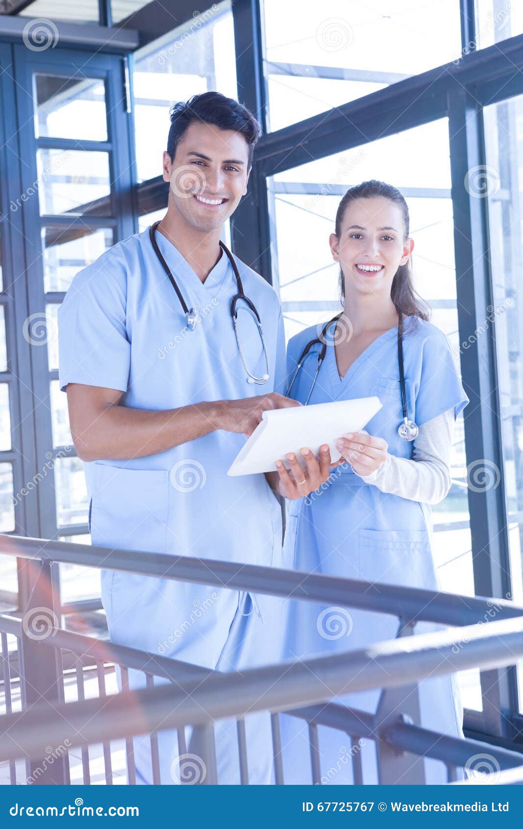 Medical Team Talking at the Hospital Stock Image - Image of holding ...