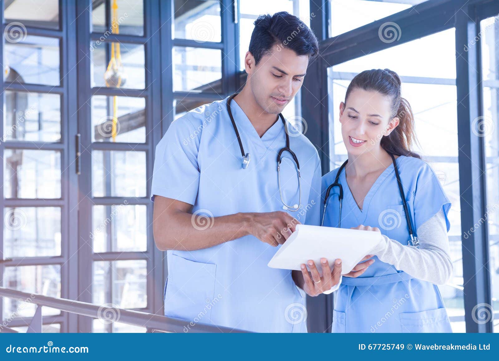Medical Team Talking at the Hospital Stock Image - Image of adult ...