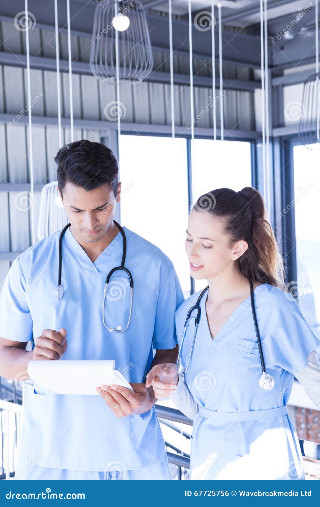 Medical Team Talking at the Hospital Stock Photo - Image of employees ...