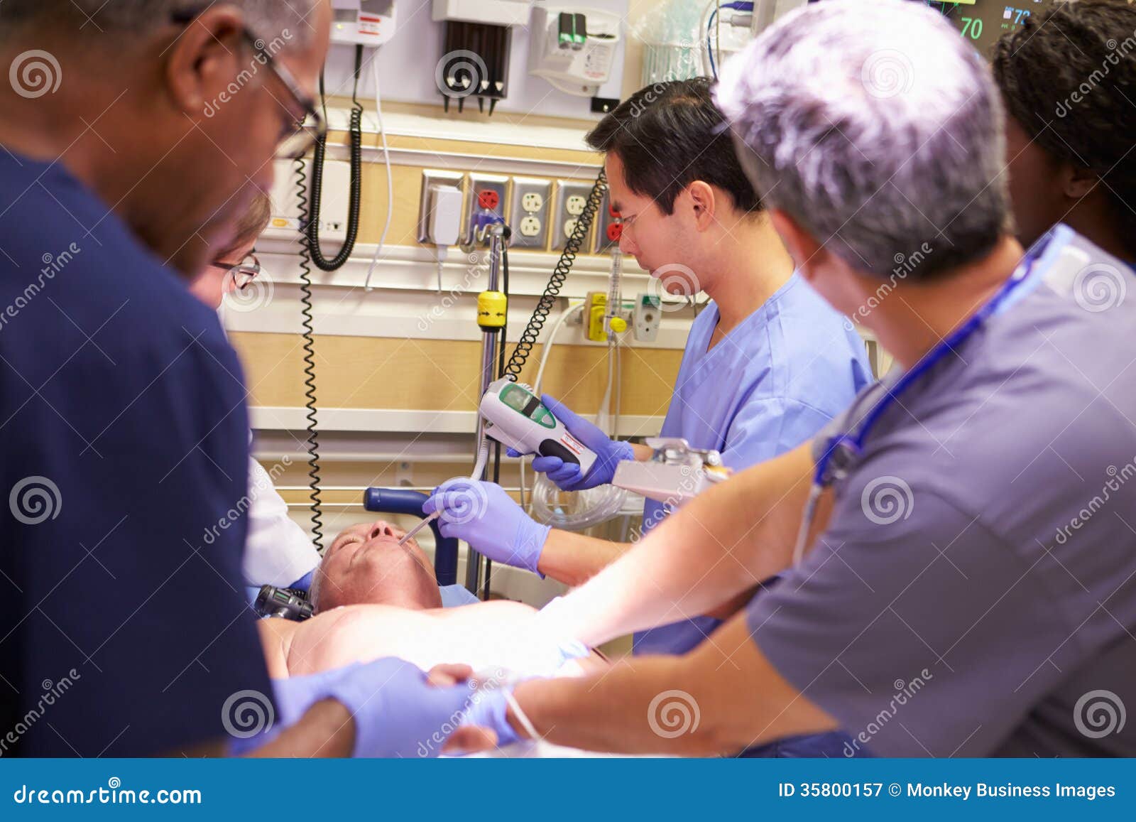 Medical Team Working on Patient in Emergency Room Stock Image - Image ...