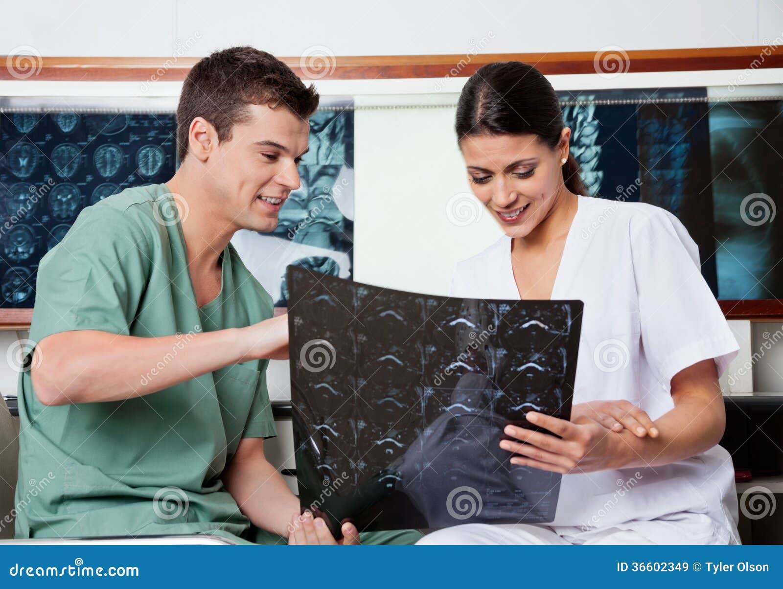 Medical Technicians Reviewing MRI X-ray Stock Image - Image of ...