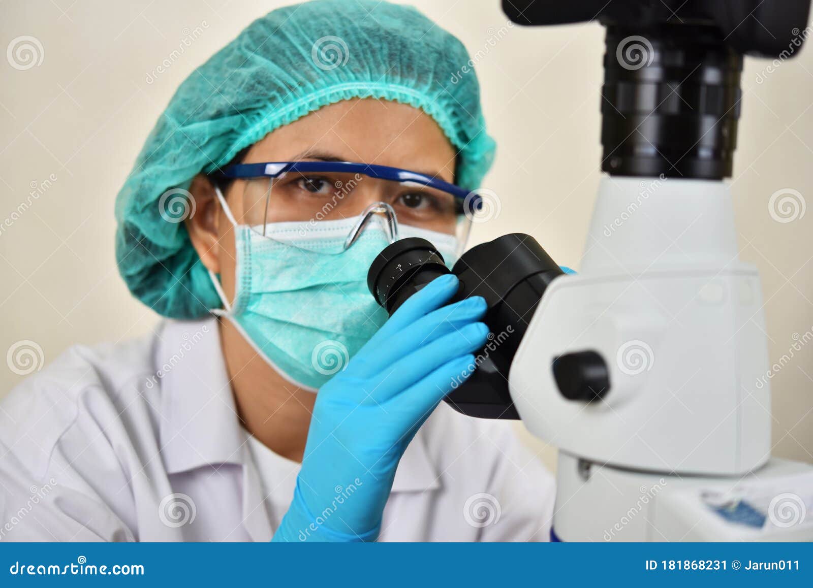 Medical Technologist Working with Microscope Stock Image - Image of ...