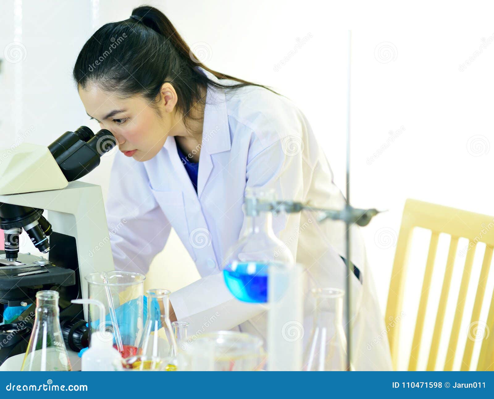 Medical Technologist Working with Microscope Stock Photo - Image of ...