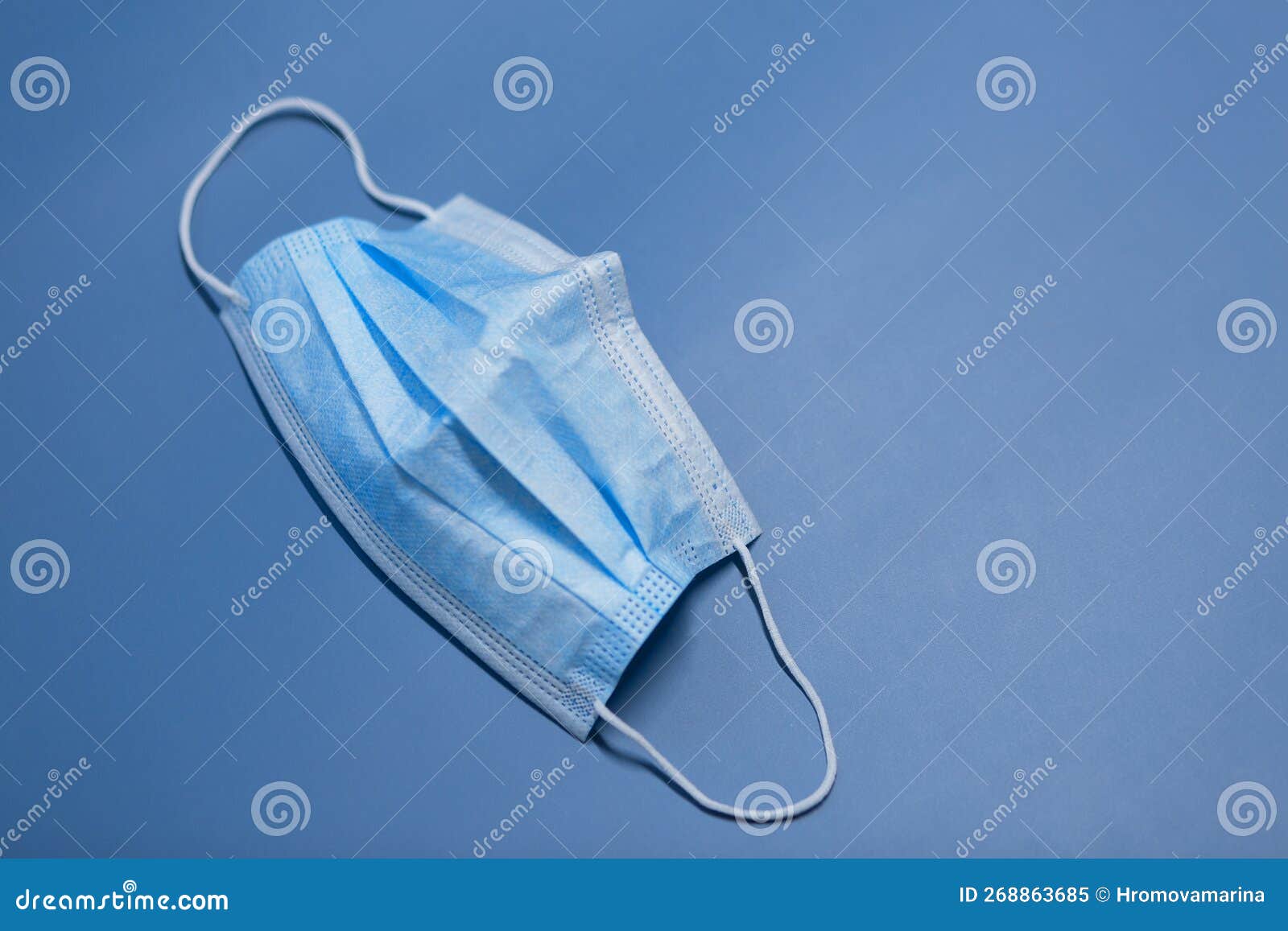 Medical Three-layer Mask on a Blue Background Stock Image - Image of ...