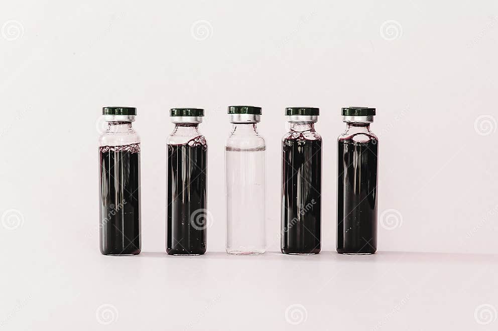 Medical vials with extract stock image. Image of group - 85407237