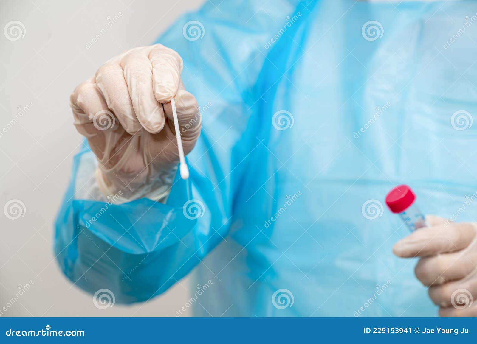 A Medical Worker Holding a Swab Sample Collection Kit Stock Image ...