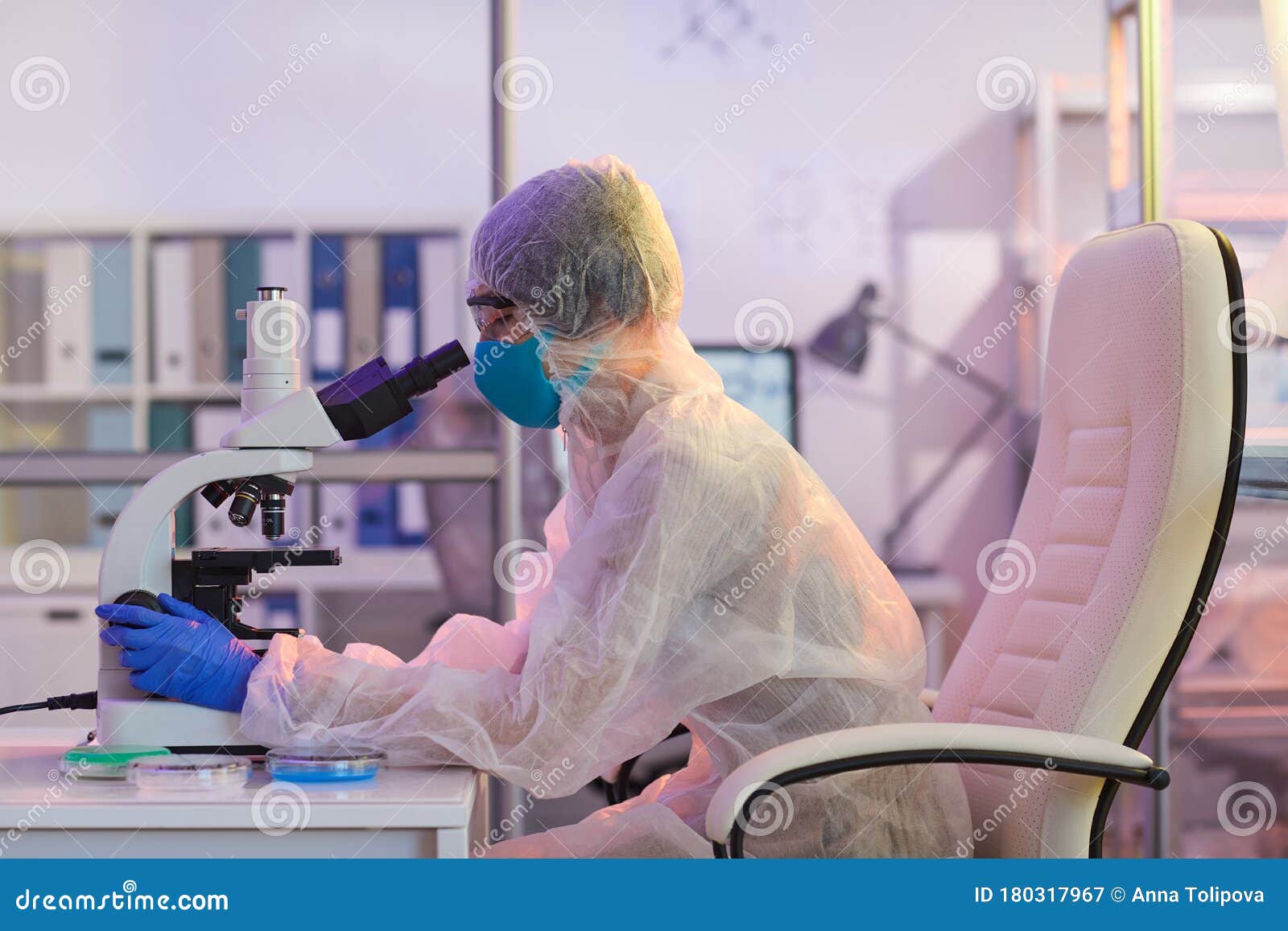 Medical Worker Using Microscope at Work Stock Image - Image of looking ...